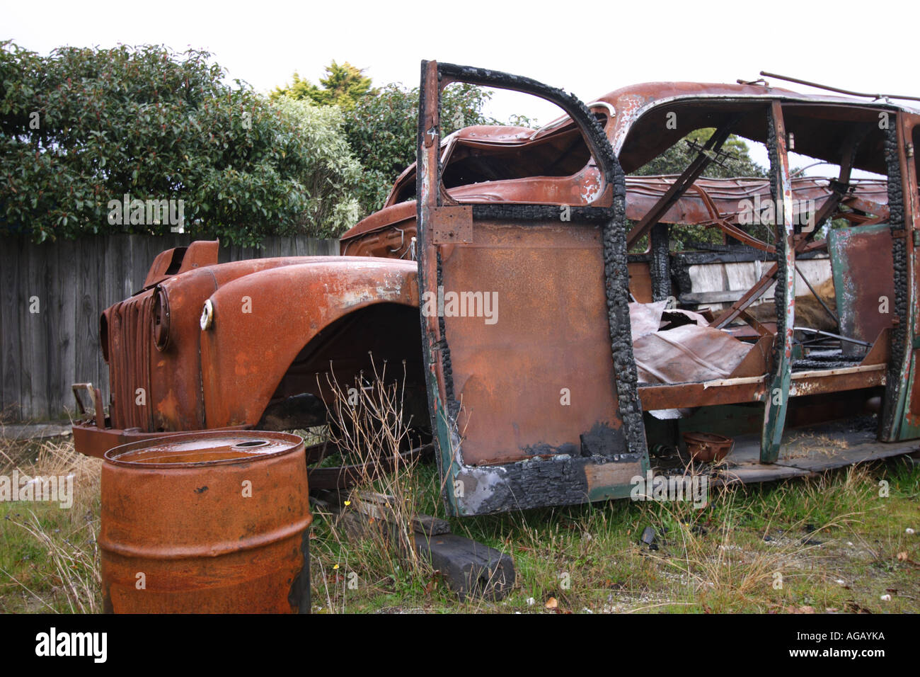 SIDE VIEW BURNT OUT RUSTY BUS HORIZONTAL BAPDB8720 Stock Photo - Alamy