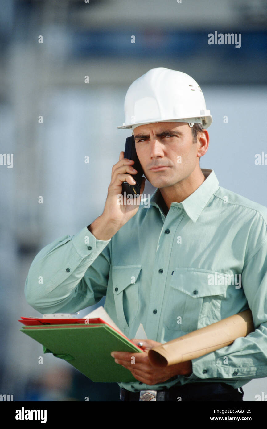 Worker on construction site Stock Photo - Alamy