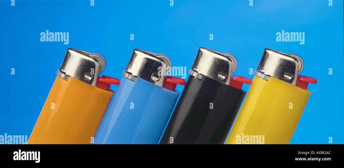 colorful cigarette lighters in a row Stock Photo - Alamy