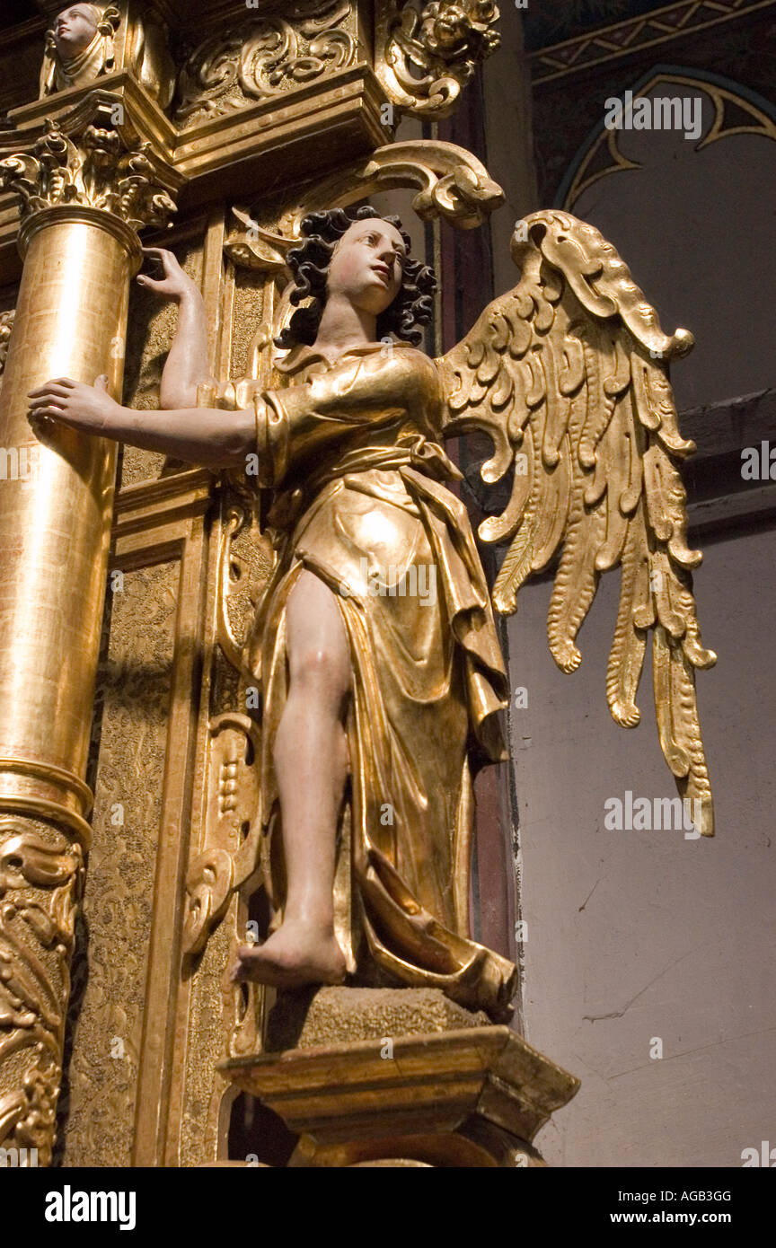 Golden baroque angel statue in frombork cathedral hi-res stock ...