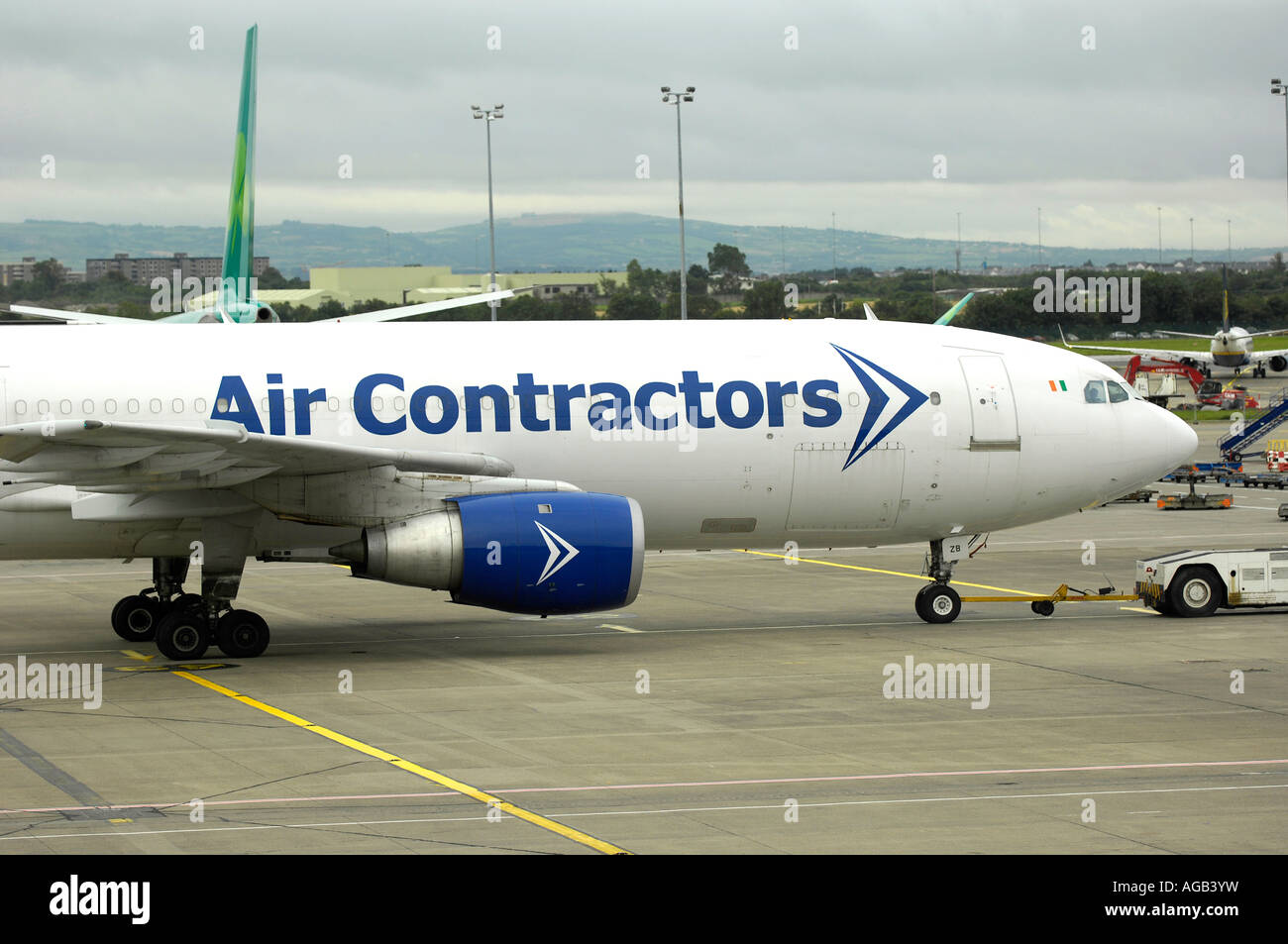 Air Contractors Jet in Dublin, Ireland in tow after landing Stock Photo ...
