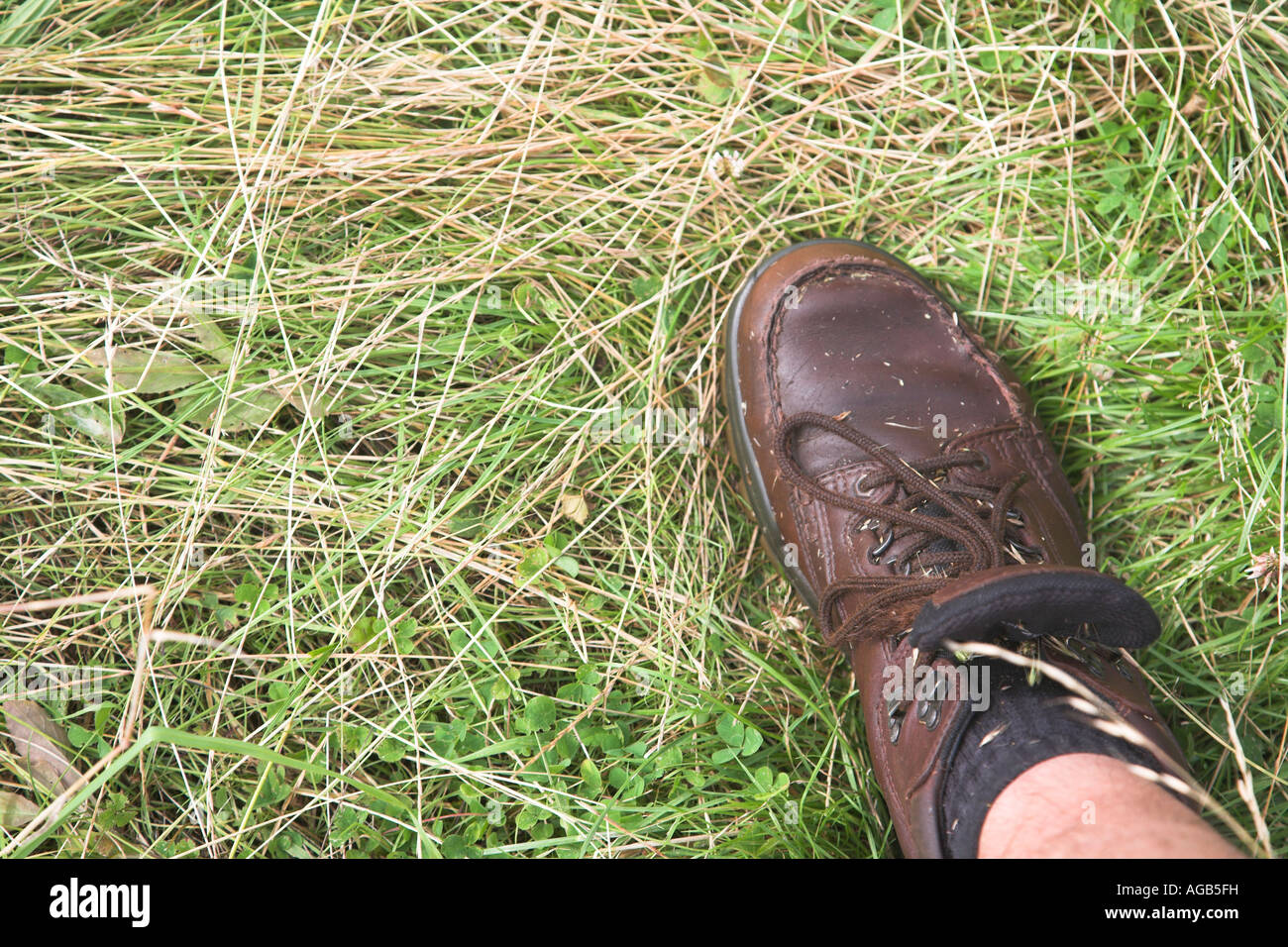View down on walking boot foot Stock Photo - Alamy