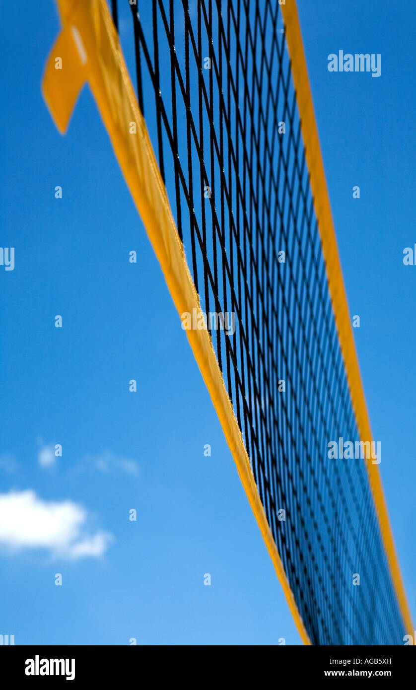 A Yellow Volleyball Footvolley Net against a blue sky Stock Photo - Alamy