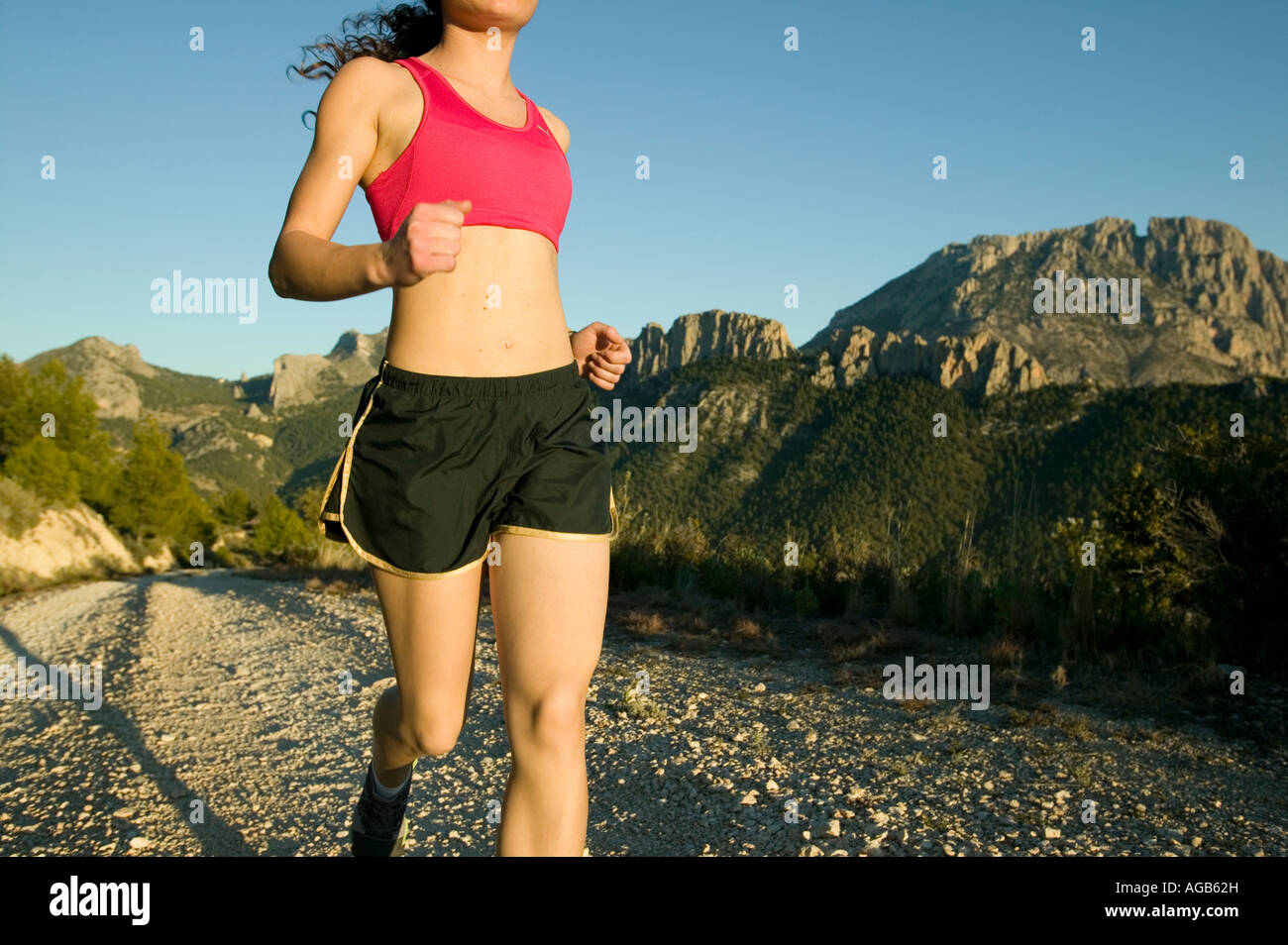 Cropped shot of female trail runner Stock Photo - Alamy