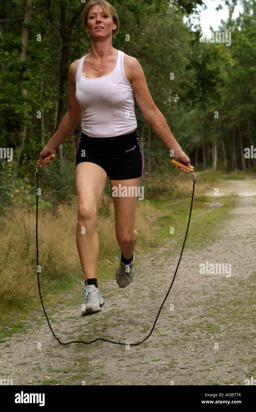Mature woman skipping rope hi-res stock photography and images - Alamy