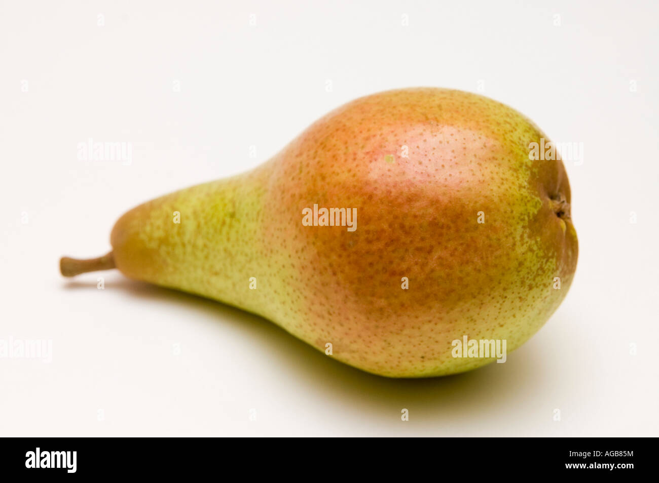 fruit single red green pear on white background Stock Photo - Alamy