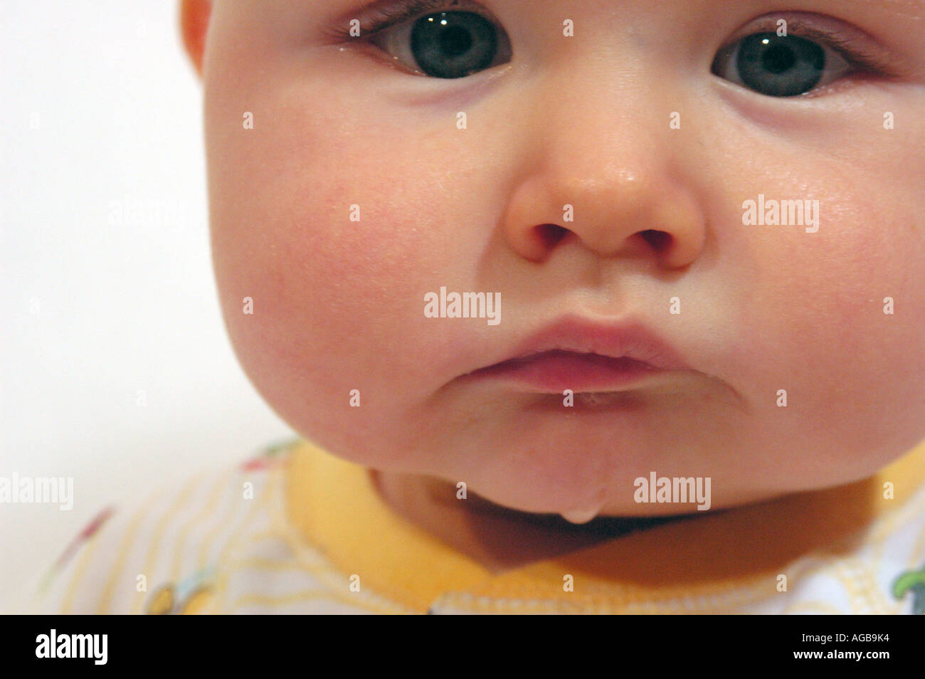 Baby drooling hi-res stock photography and images - Alamy