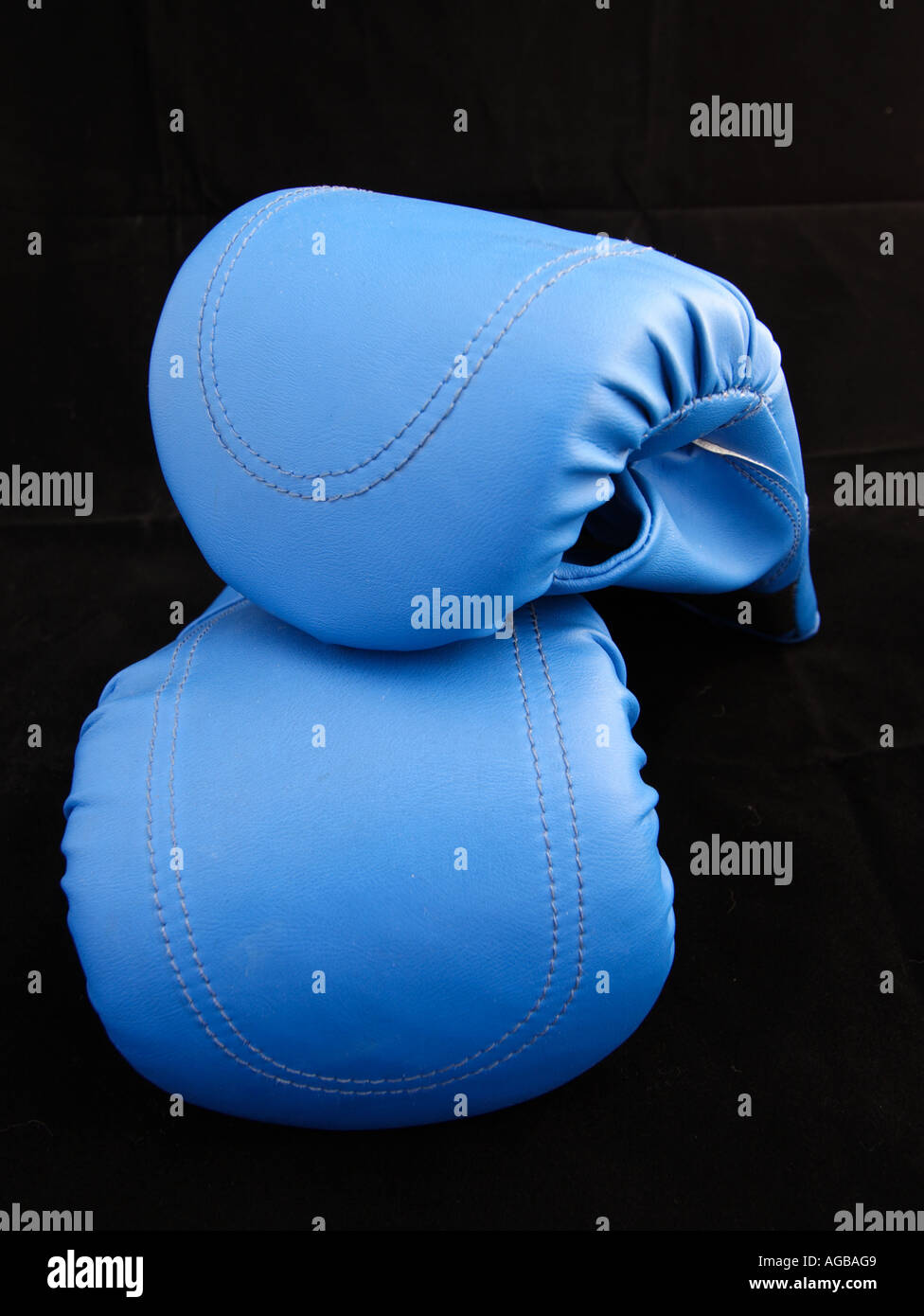PAIR OF BLUE BOXING GLOVES BLACK BACKGROUND VERTICAL BAPDB8186 Stock ...