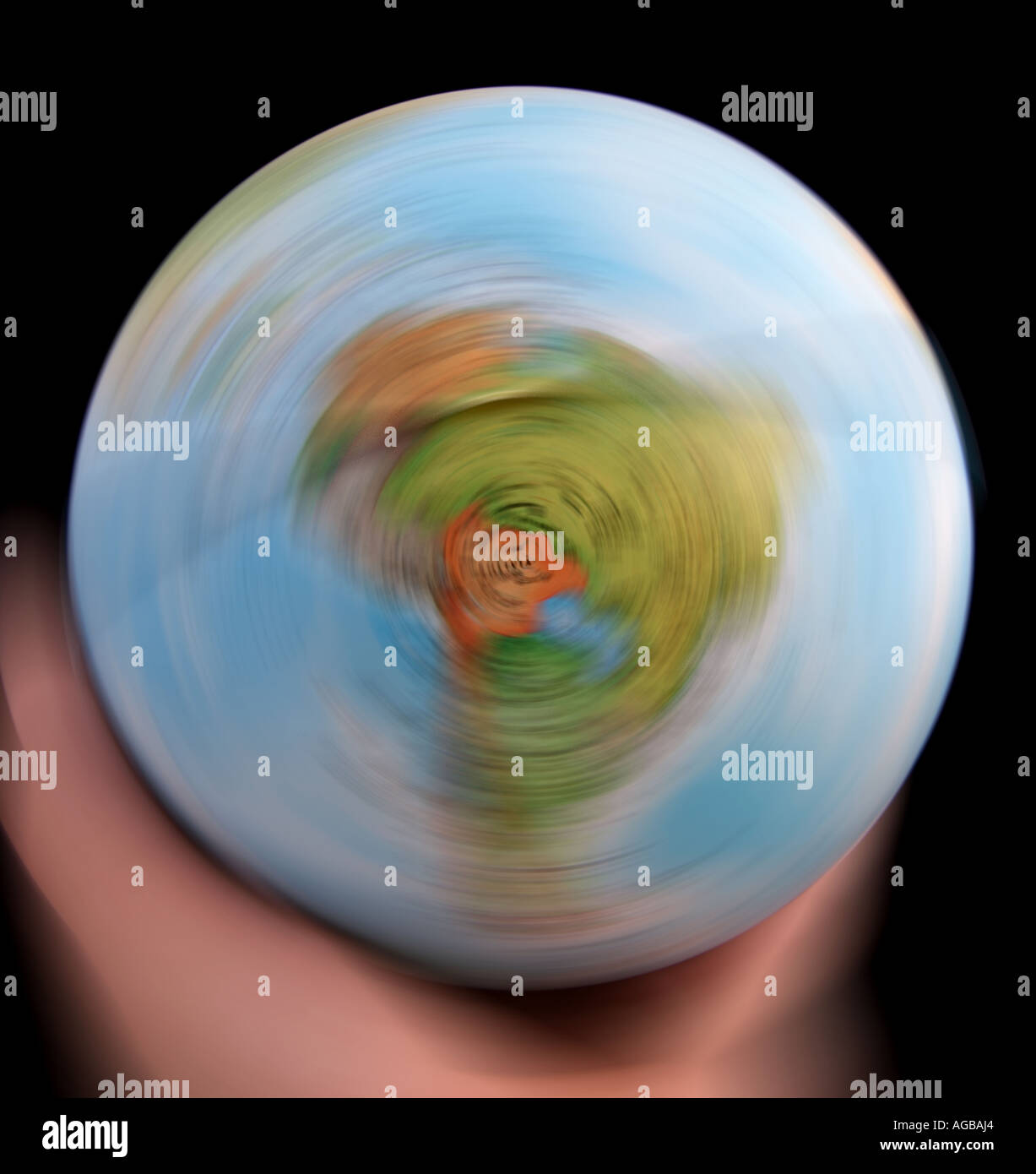 GLOBE OF THE WORLD SPINNING IN A HAND BAPDB8201 SQUARE FORMAT Stock ...