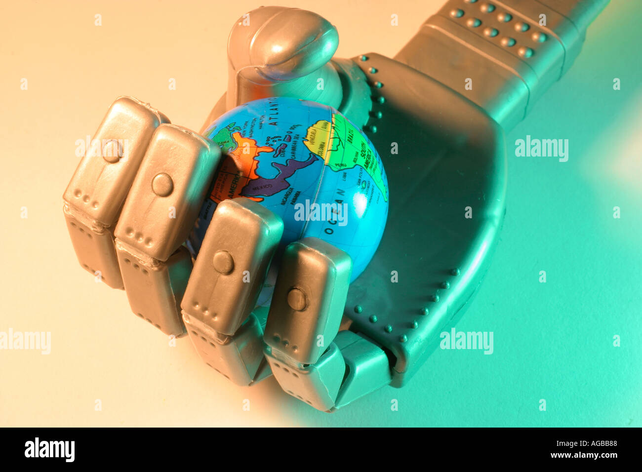 Robot Hand Holding Globe Stock Photo - Alamy