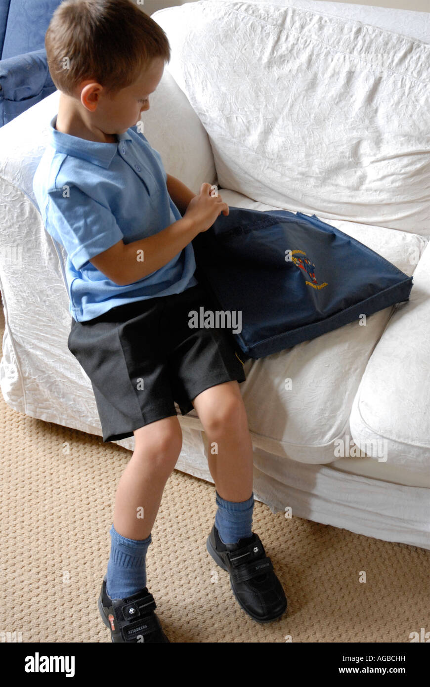 Little boy getting ready for school Stock Photo - Alamy