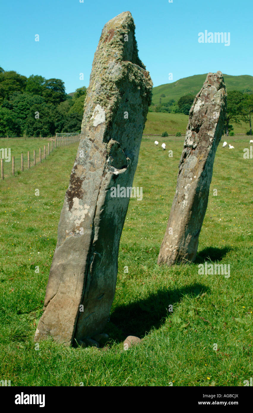 Large standing stone with visitor hi-res stock photography and images ...