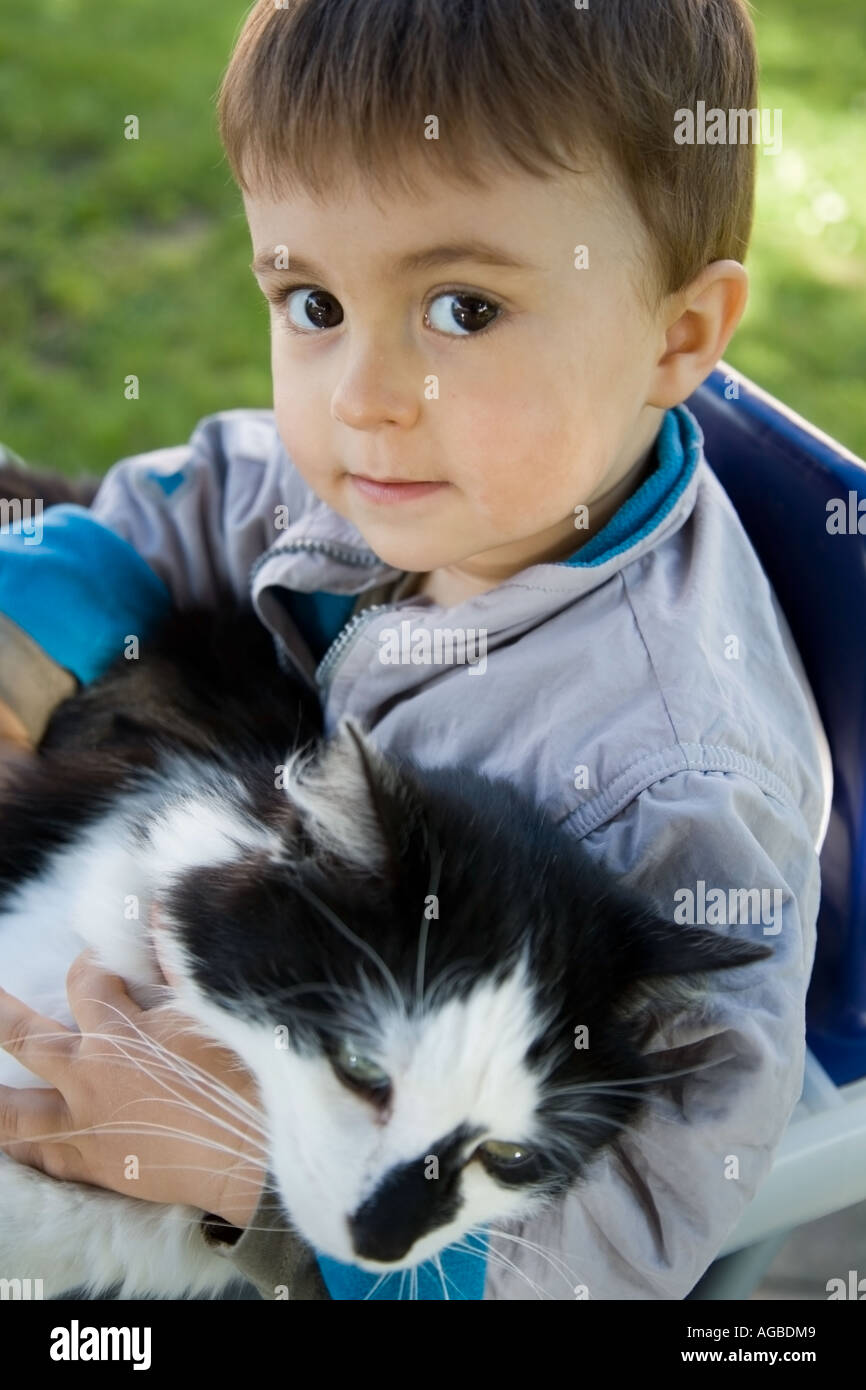 Boy with a cat hi-res stock photography and images - Alamy