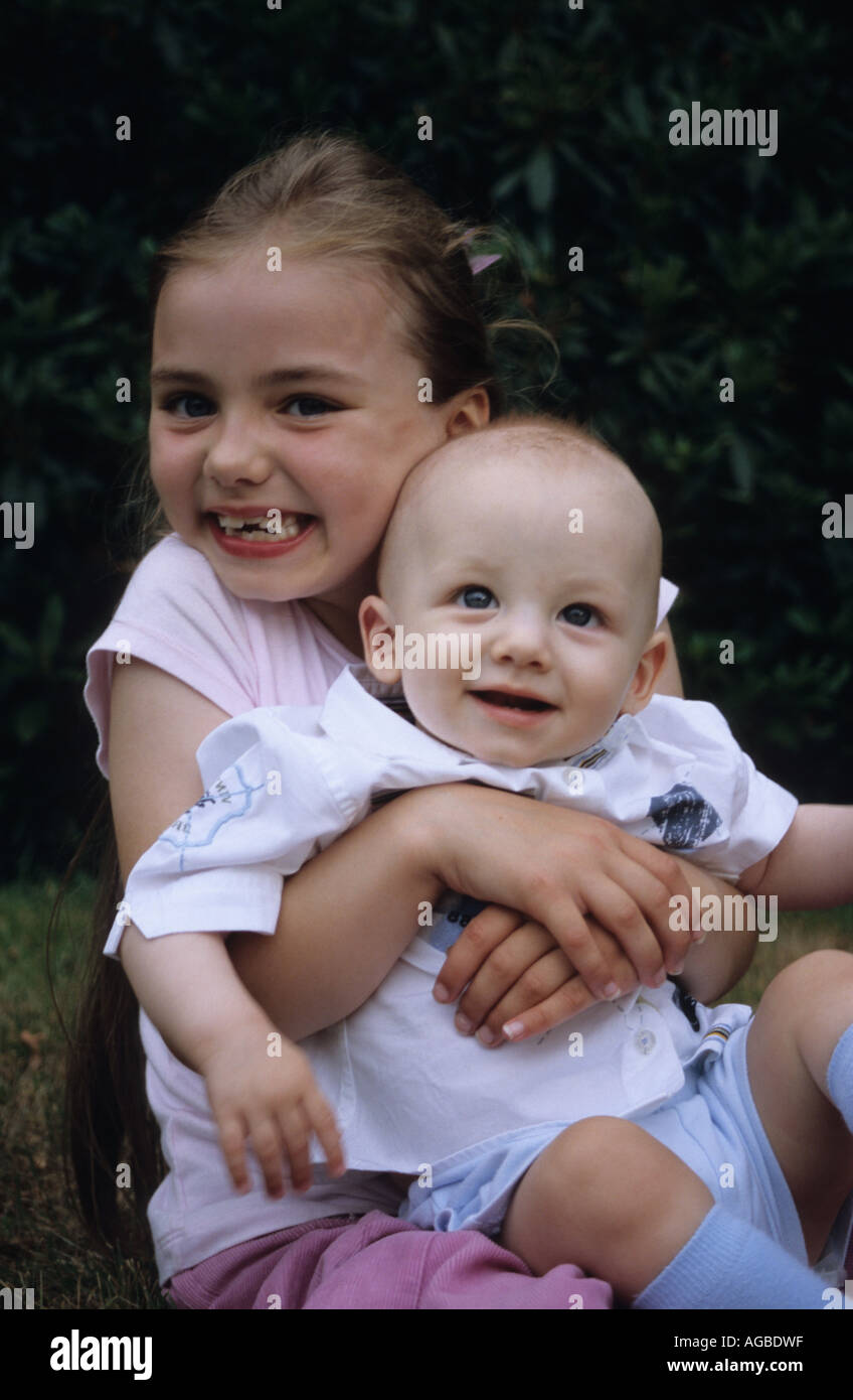 Six Year Old Girl With Baby Brother Stock Photo - Alamy