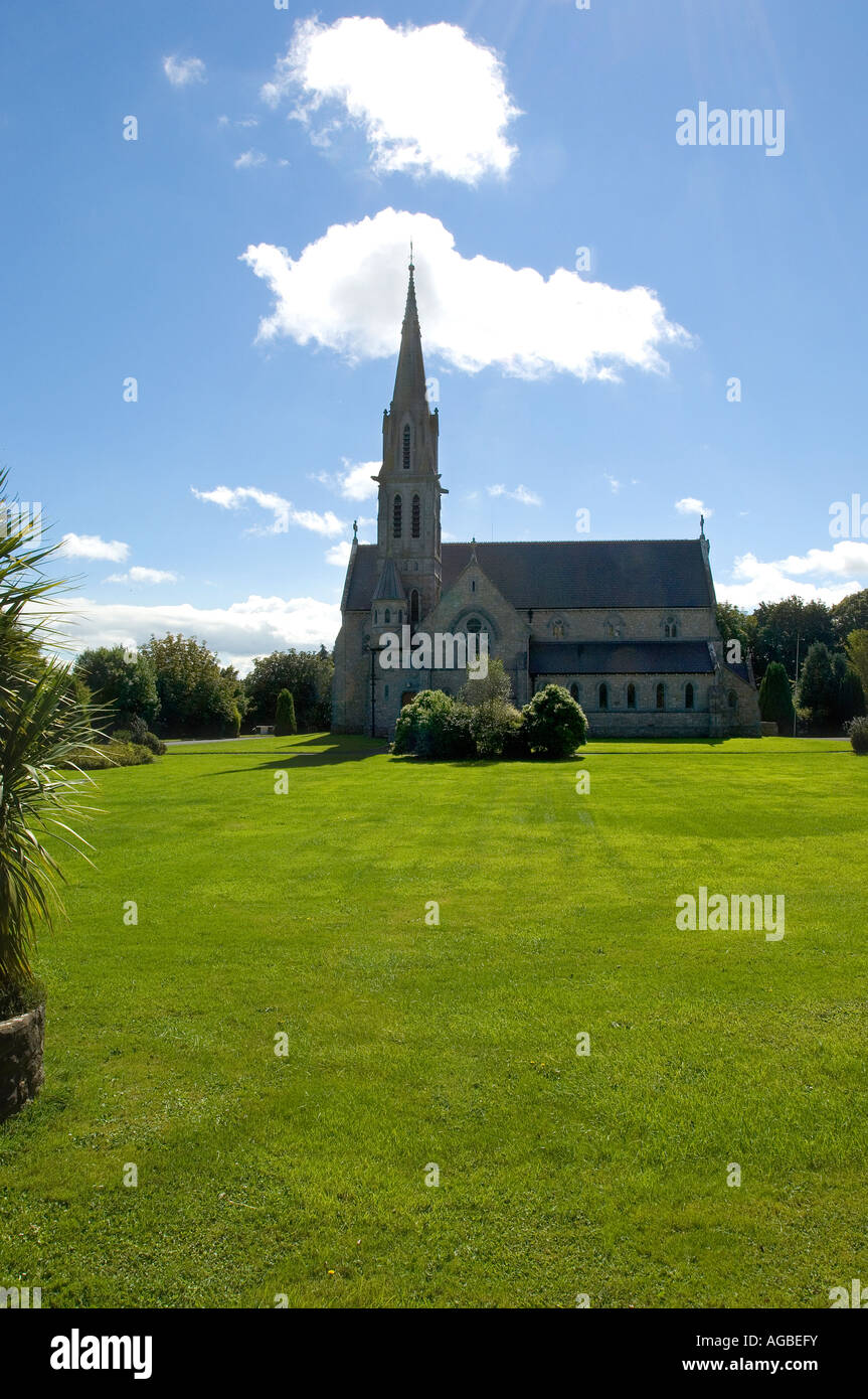 Church, green grass and blue sky in Ireland Stock Photo - Alamy