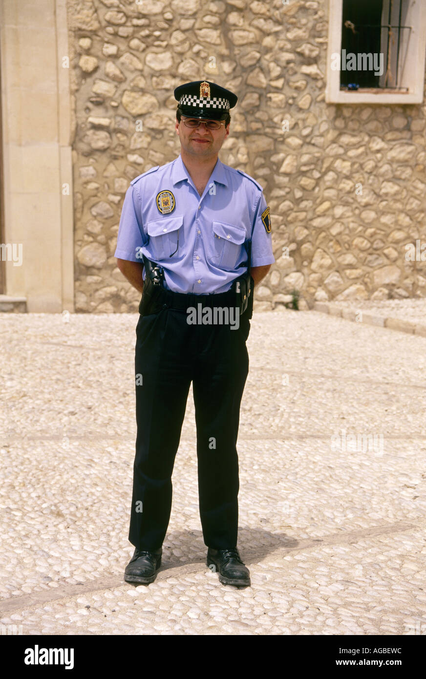 A smiling local policeman Stock Photo - Alamy