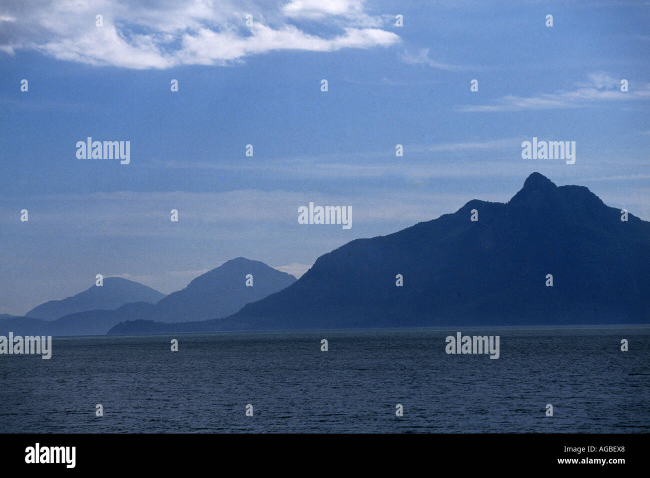 A view of Howe Sound out over the mountains into the sea which has a ...