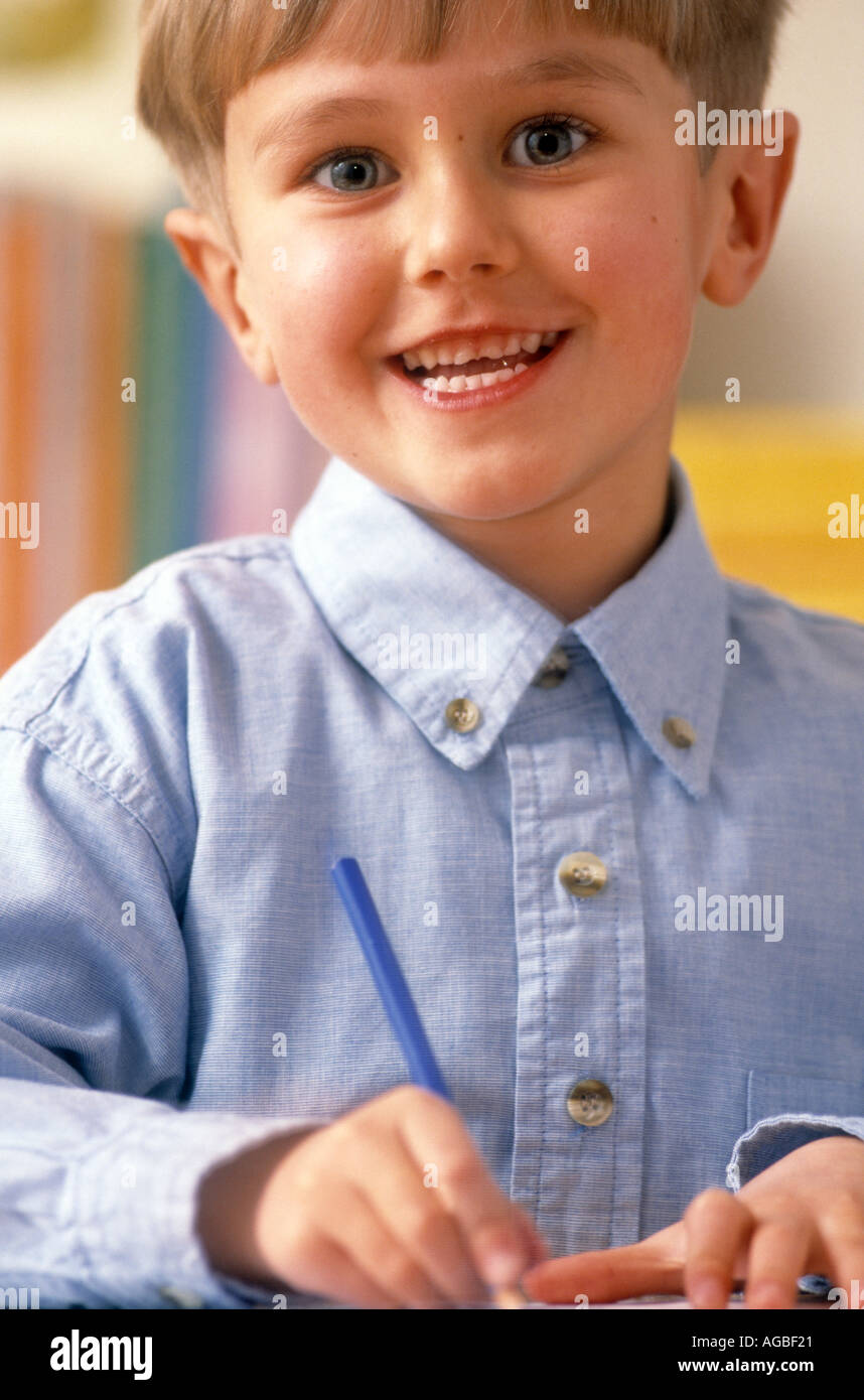 Close up of child writing at school Stock Photo - Alamy