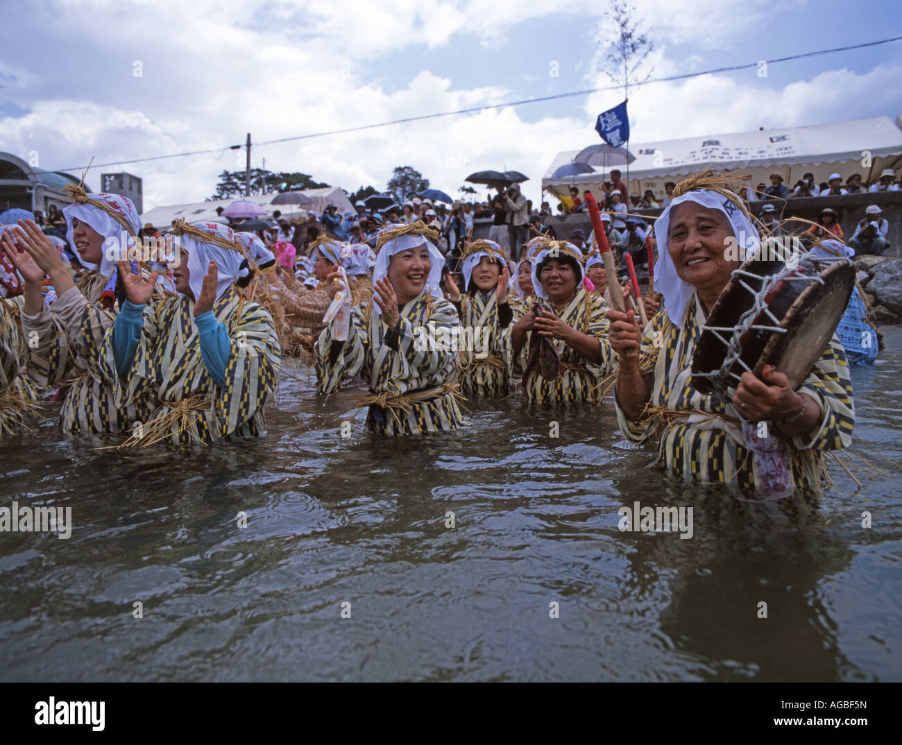 Shioya Ungami festival in Ogimi Village, Okinawa, Japan. The women of ...