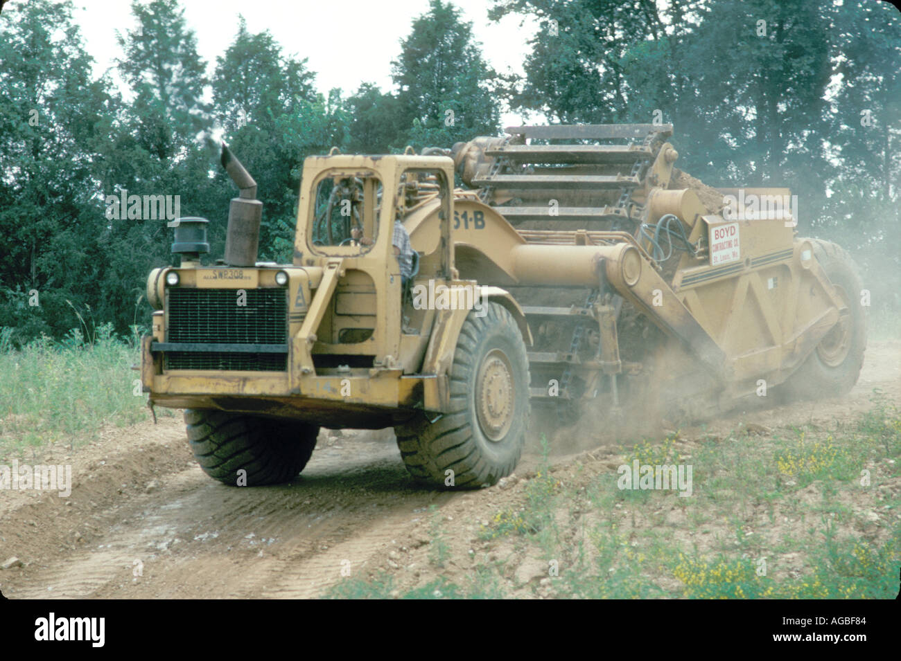 Earth mover at construction site Stock Photo - Alamy