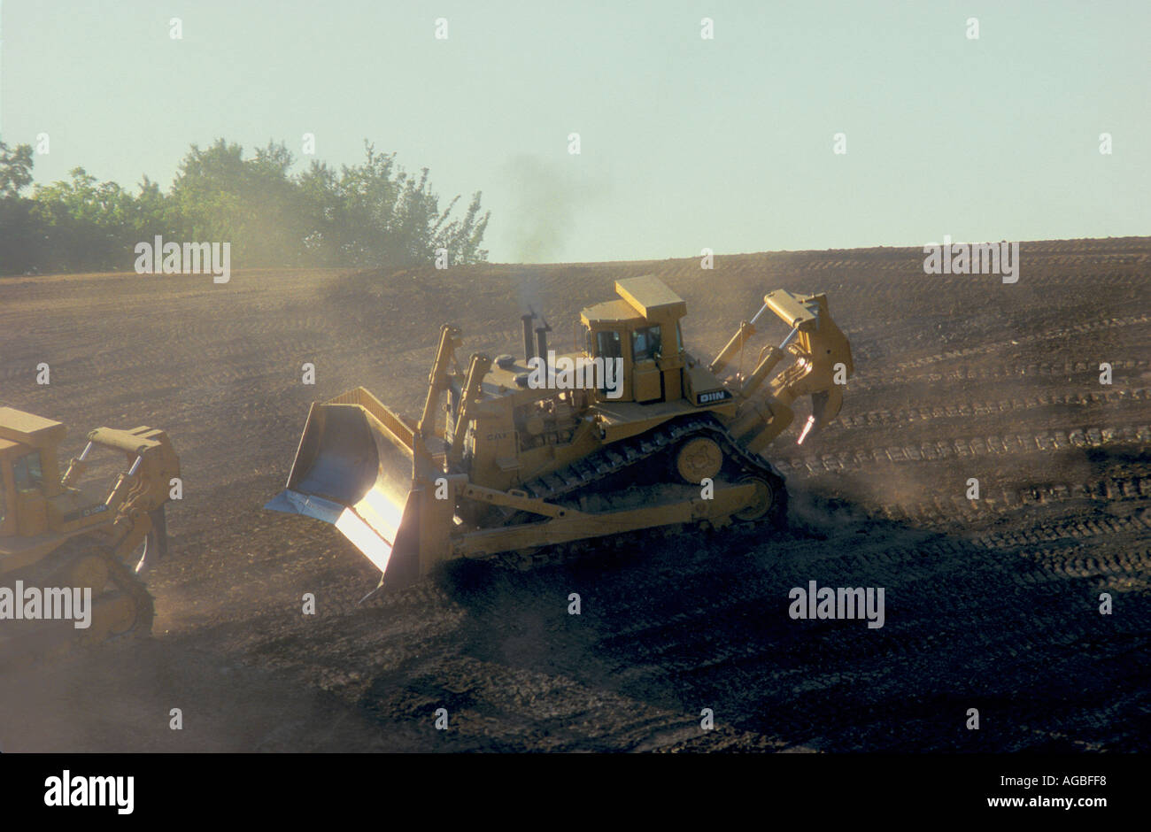 Caterpillar or cat bulldozer with ripper attachment Stock Photo - Alamy