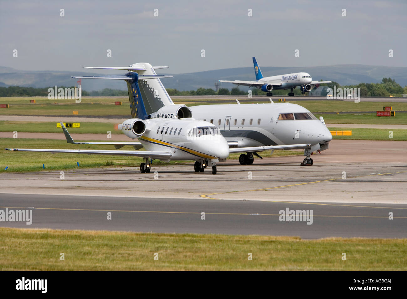 Three jetliners at airport Stock Photo - Alamy