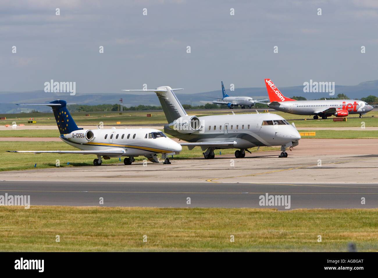 Four jets at airport Stock Photo - Alamy