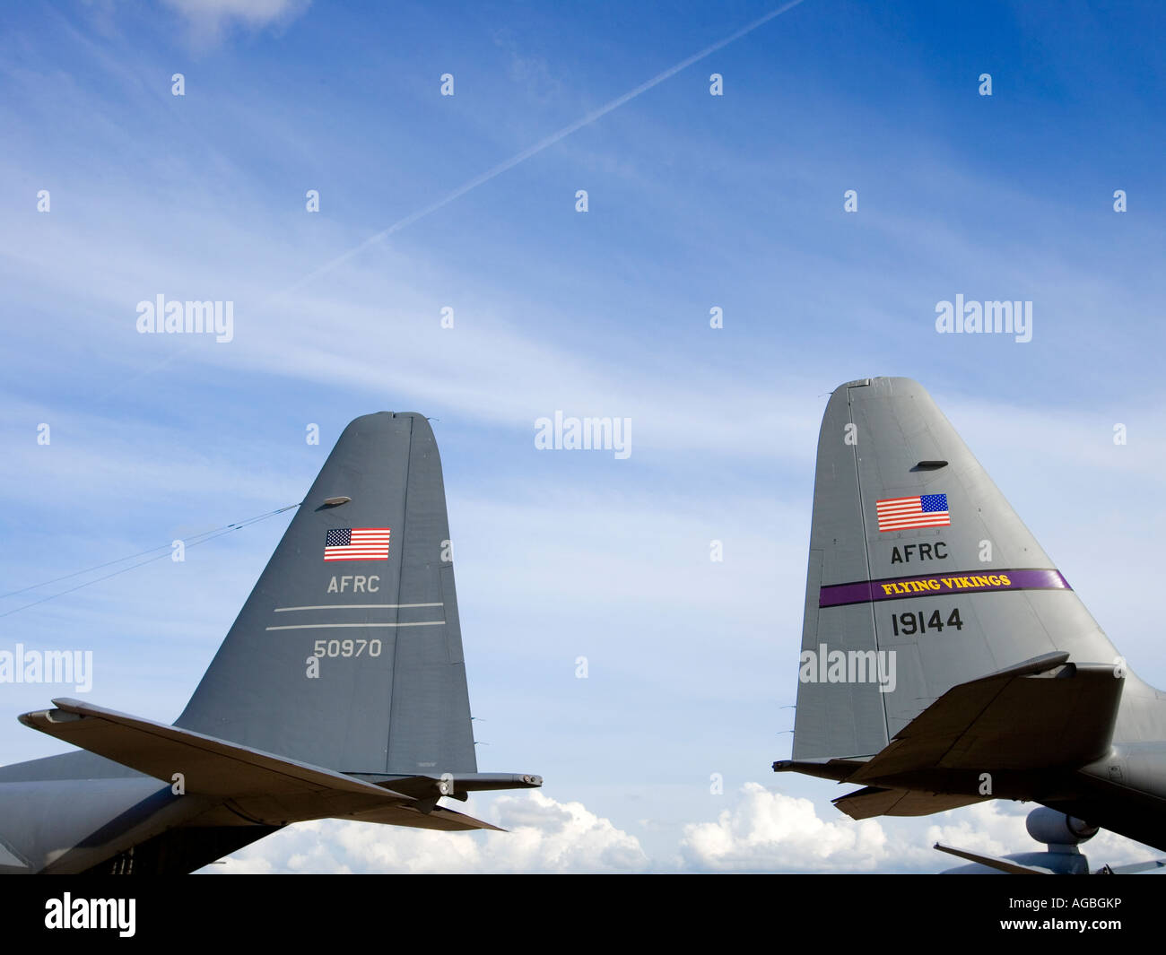 Two tails of a USAF Air Force Lockheed Martin C-130J Hercules paked up ...
