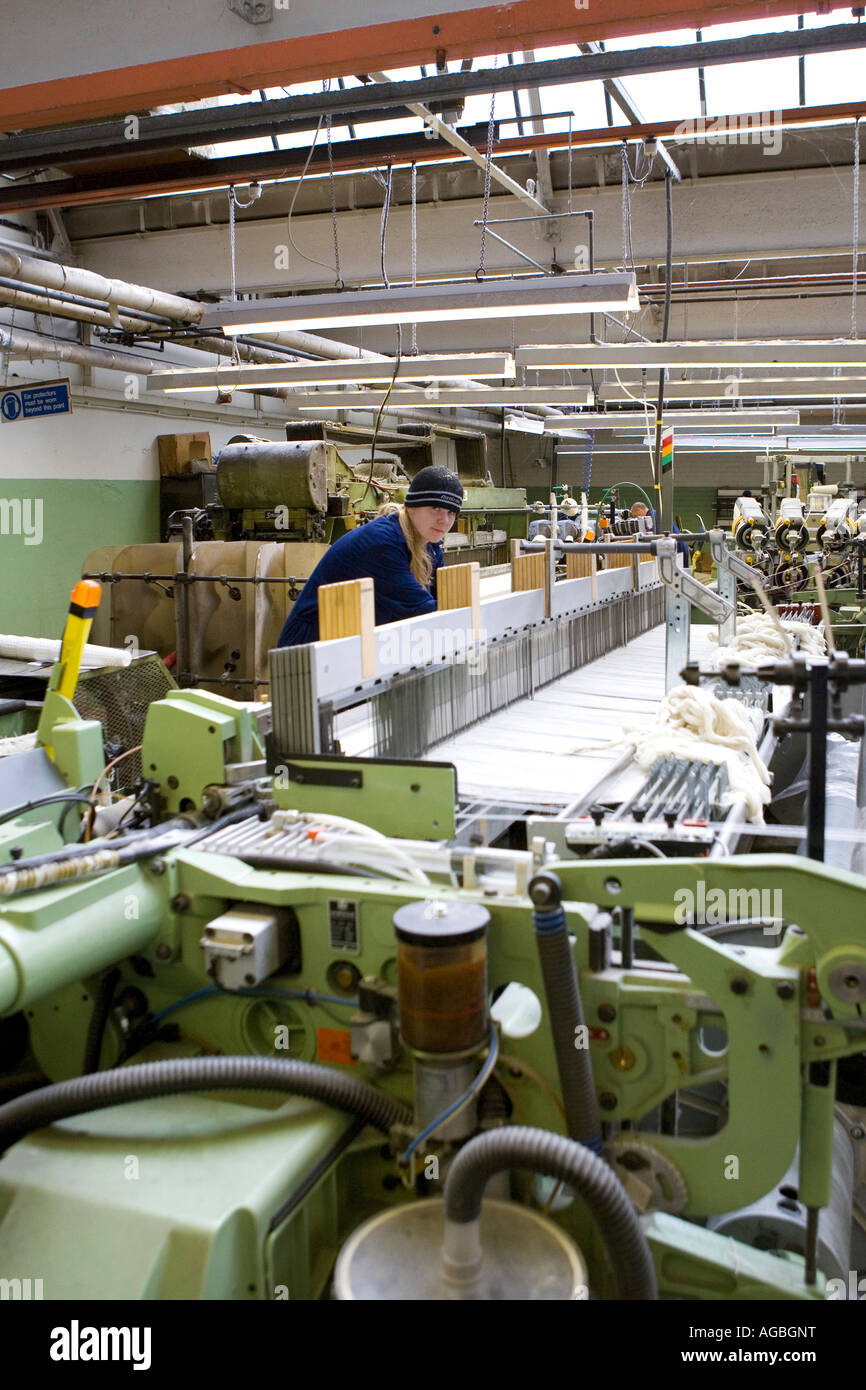 Young male worker at textile factory Stock Photo - Alamy