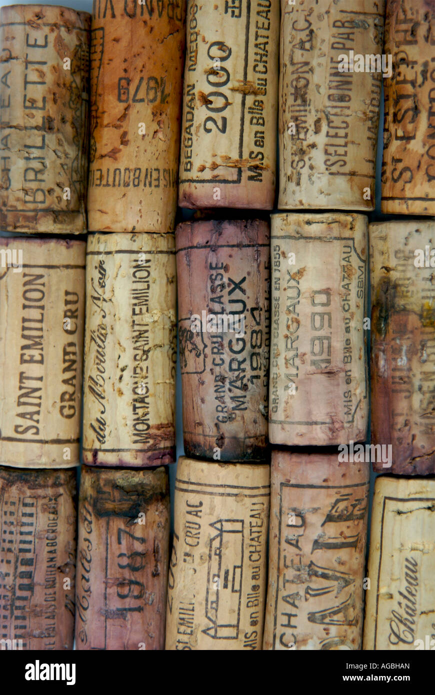 A variety of french wine corks displayed together, featuring labels ...
