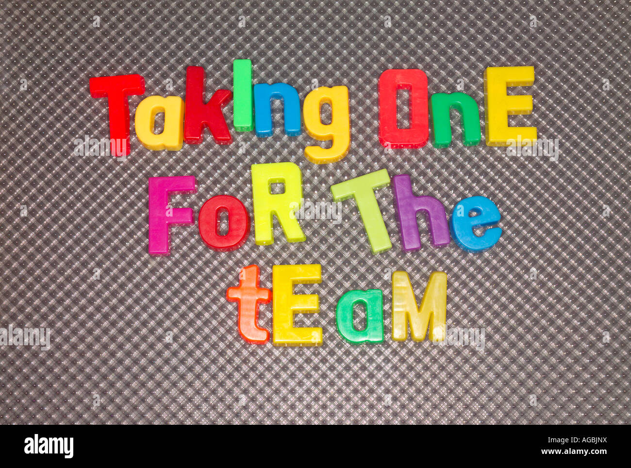 taking one for the team fridge magnets Stock Photo - Alamy