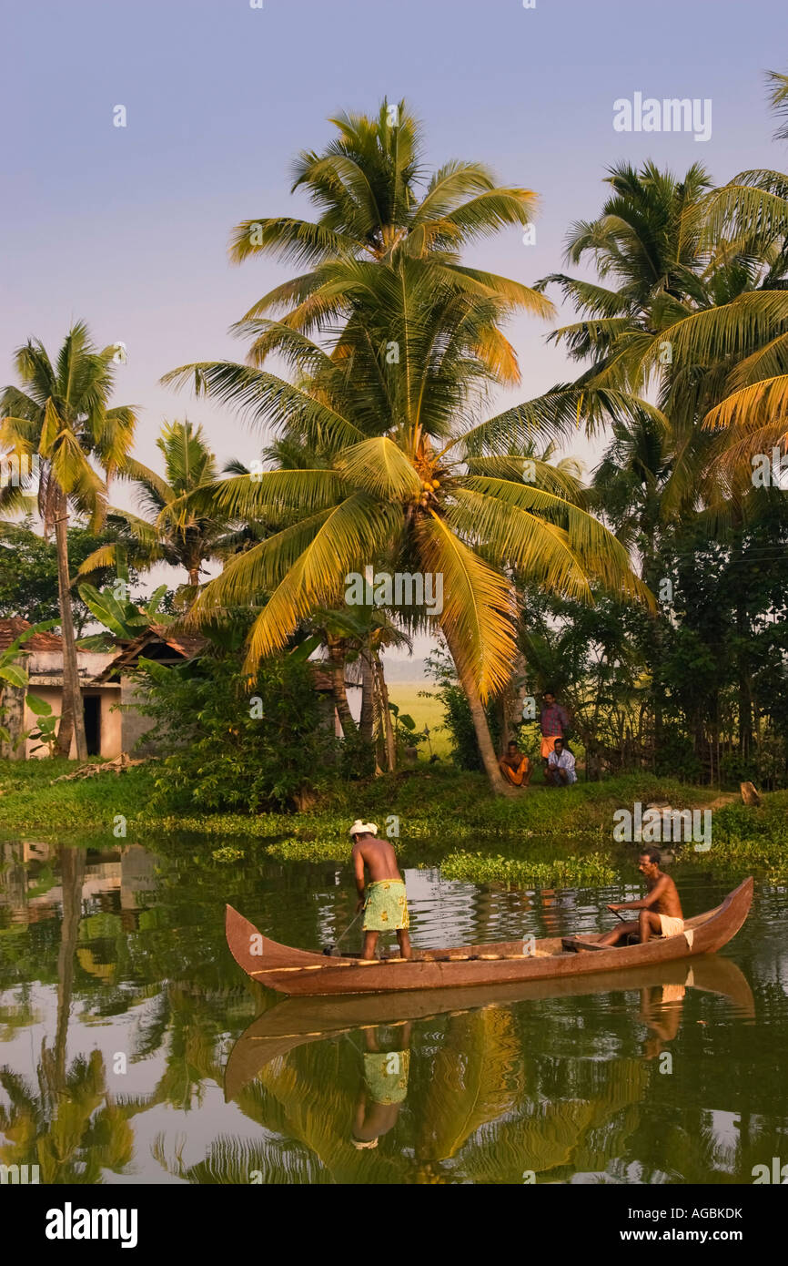India Kerala backwaters indian people in canoe Stock Photo - Alamy