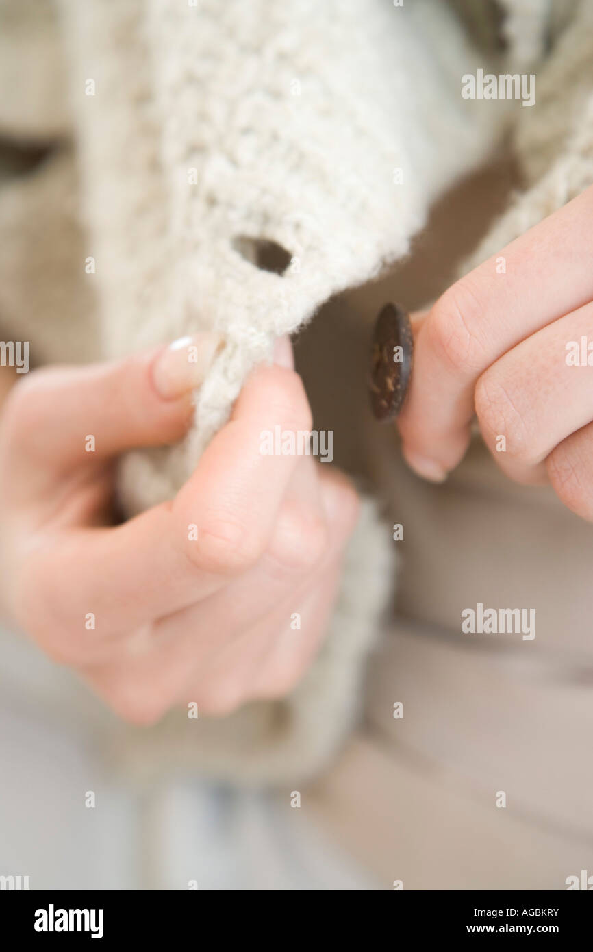 Sweater buttons hi-res stock photography and images - Alamy