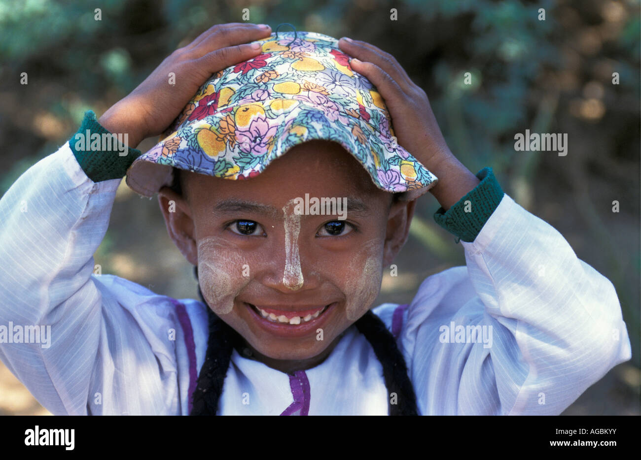 Myanmar, Bagan, Boy with thanaka cream on face Stock Photo - Alamy