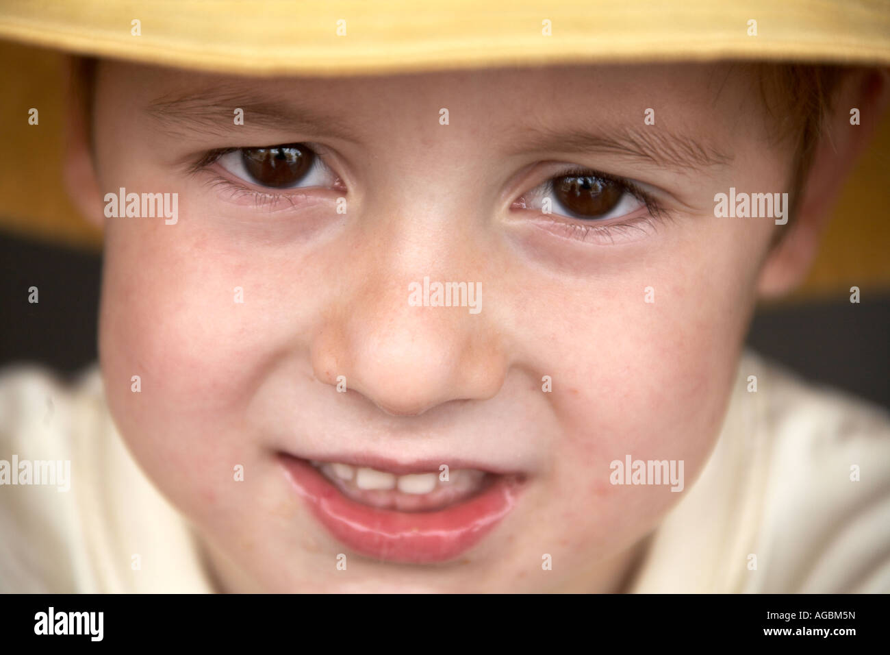 Young boy child wearing yellow hat in Sydney New South Wales NSW ...