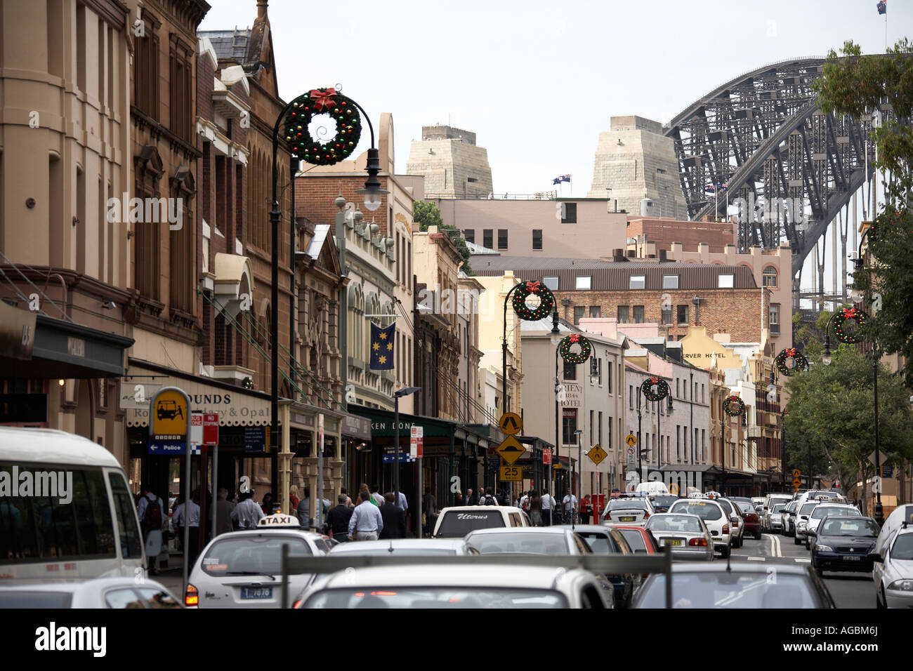 Old historic buildings and traffic on George St in the Rocks area of ...