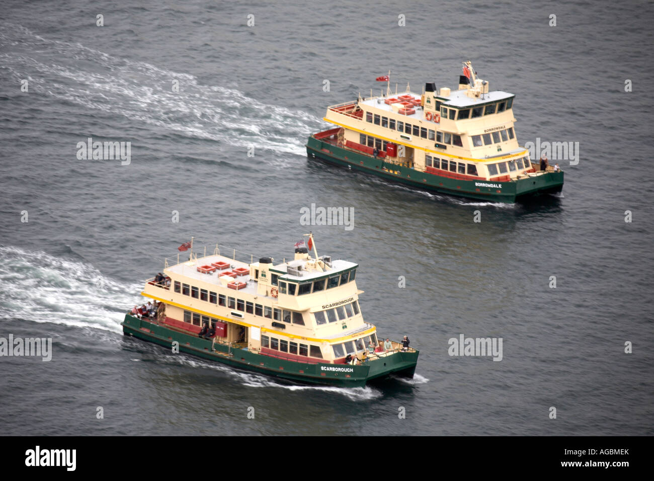 High level oblique aerial view of two ferry boats on the harbour in ...