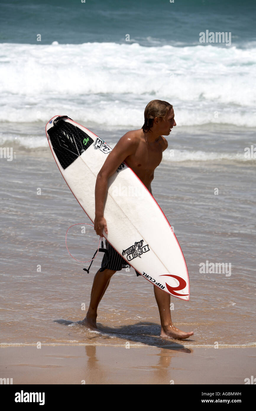 Man surfer with surfboard on Bondi Beach Sydney New South Wales NSW ...