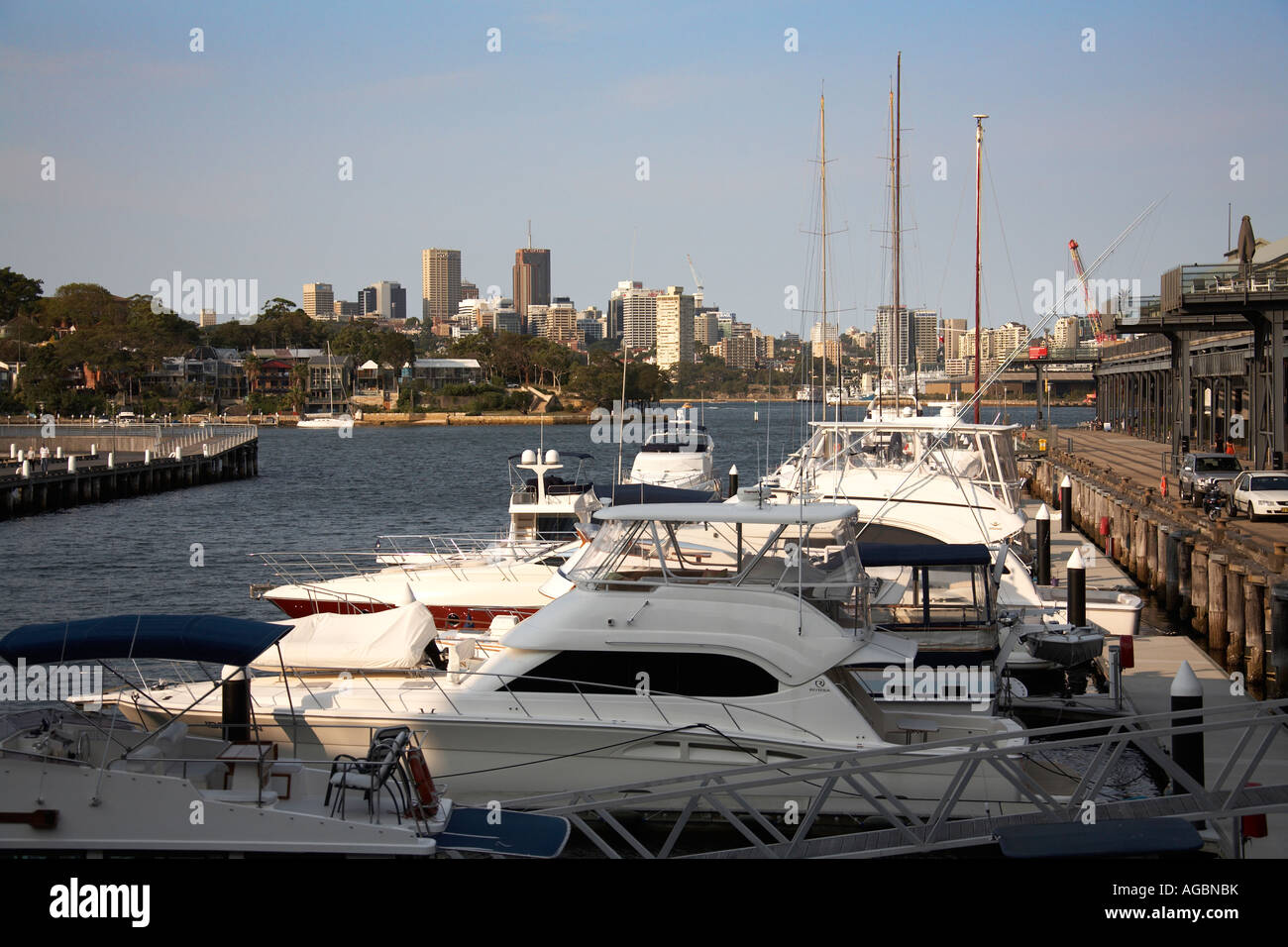 Pyrmont harbour houses by waterfront with ships in marina in Sydney New ...