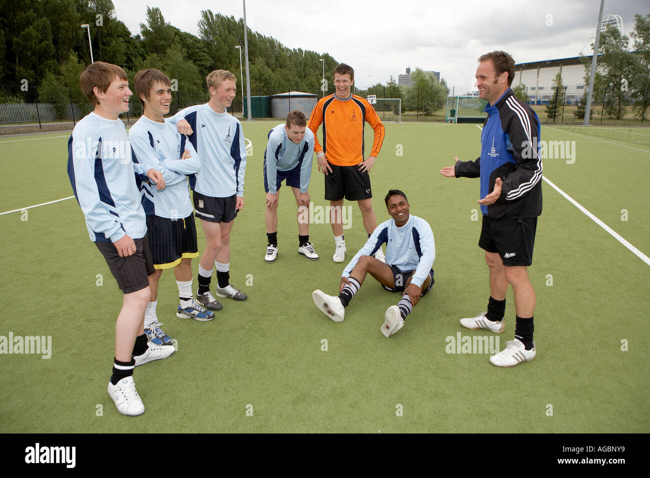 Male coach encourage players hi-res stock photography and images - Alamy