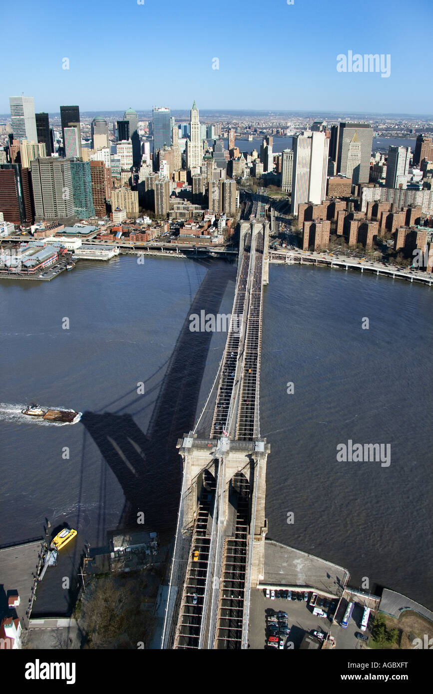 Aerial view of Brooklyn Bridge with East River and Manhattan buildings ...
