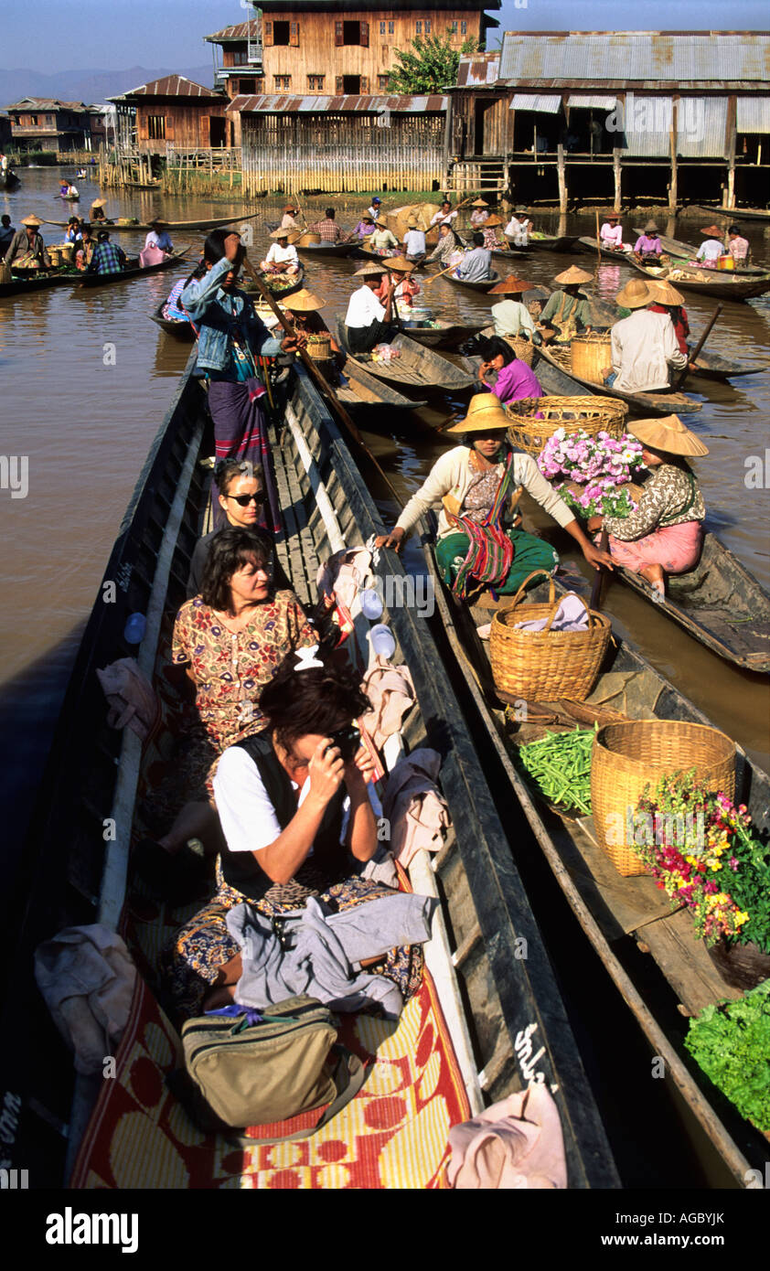Myanmar, Inle Lake, Tourist taking picture of floating market Stock ...
