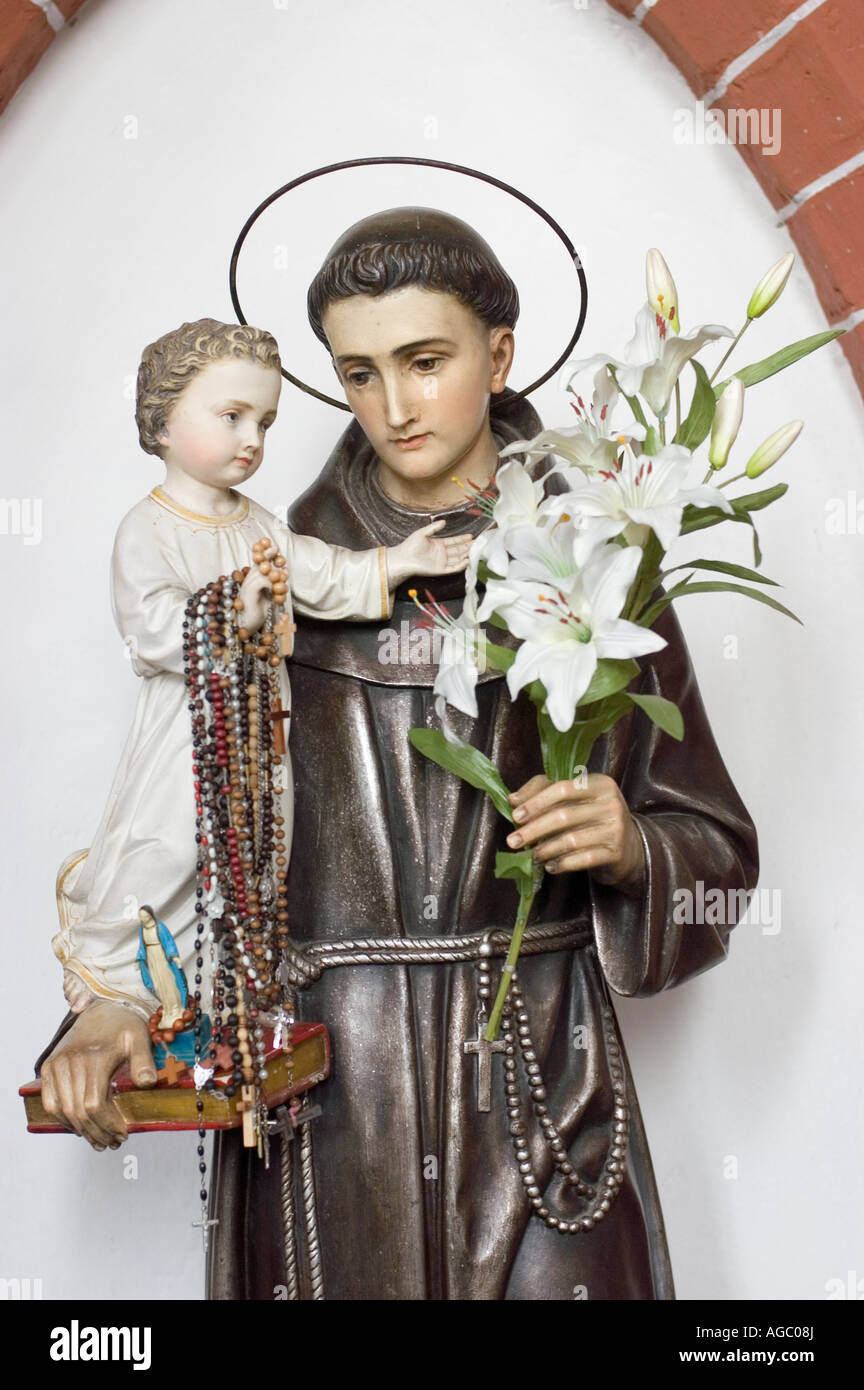 Statue of St. Dominic with Christ Child and lilies in St. Peter and ...