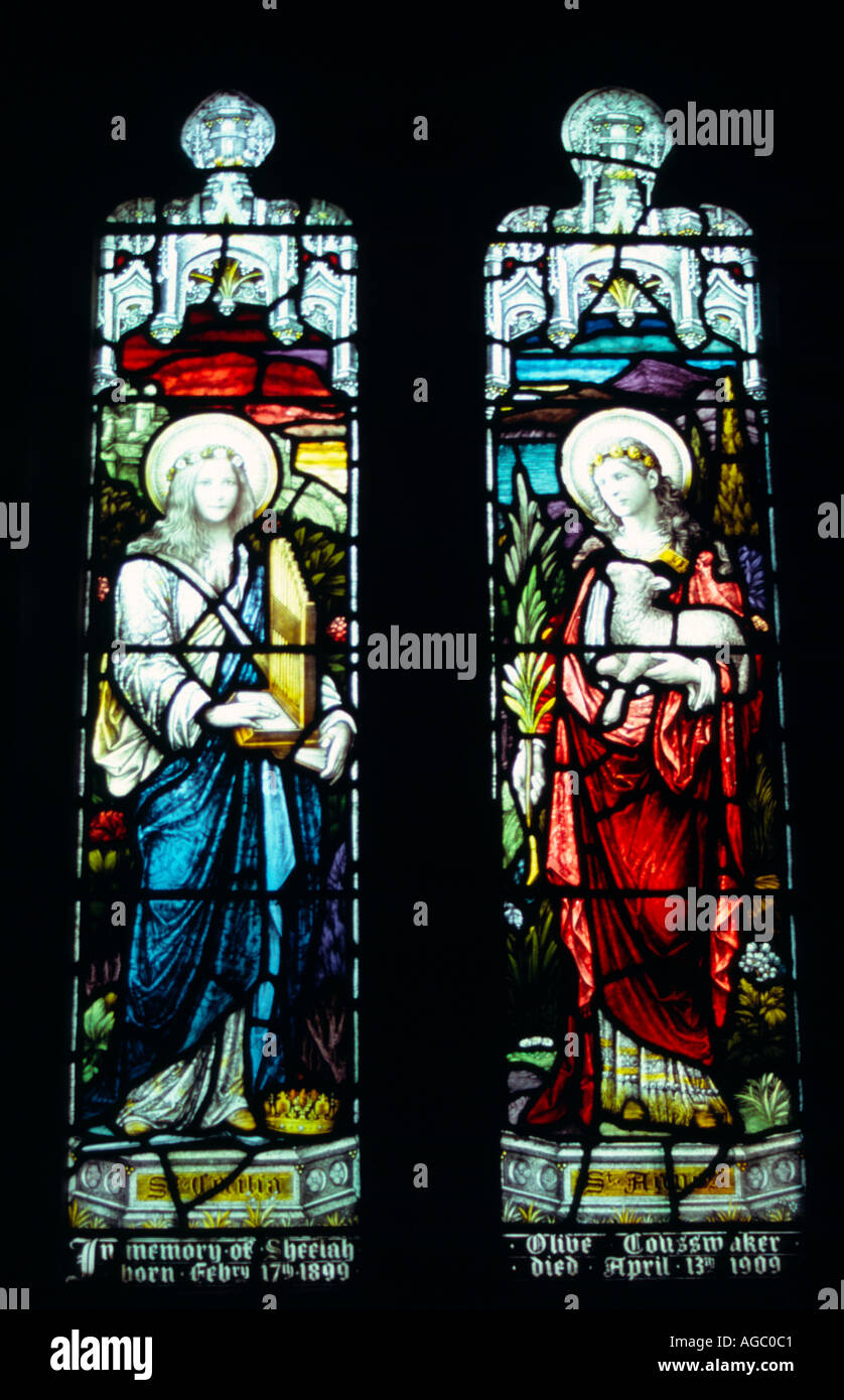 Stained glass window depicting St Agnes and St Cecilia Stock Photo - Alamy