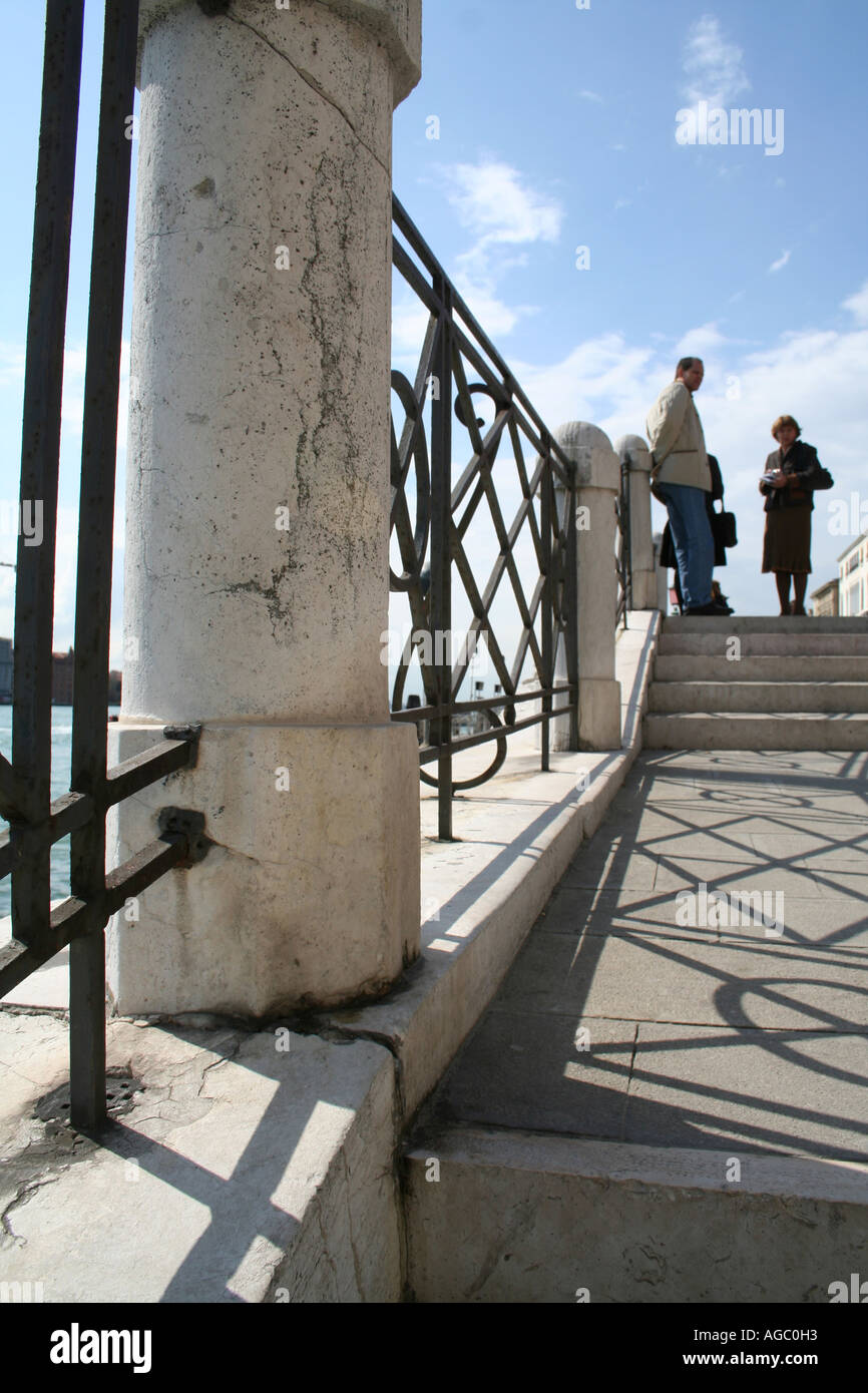 People standing on bridge in Venice Stock Photo - Alamy