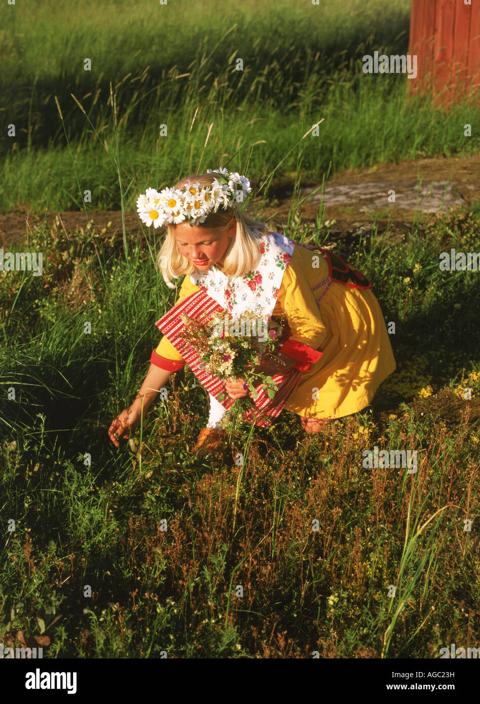 Girl in traditional midsummer dress hi-res stock photography and images ...