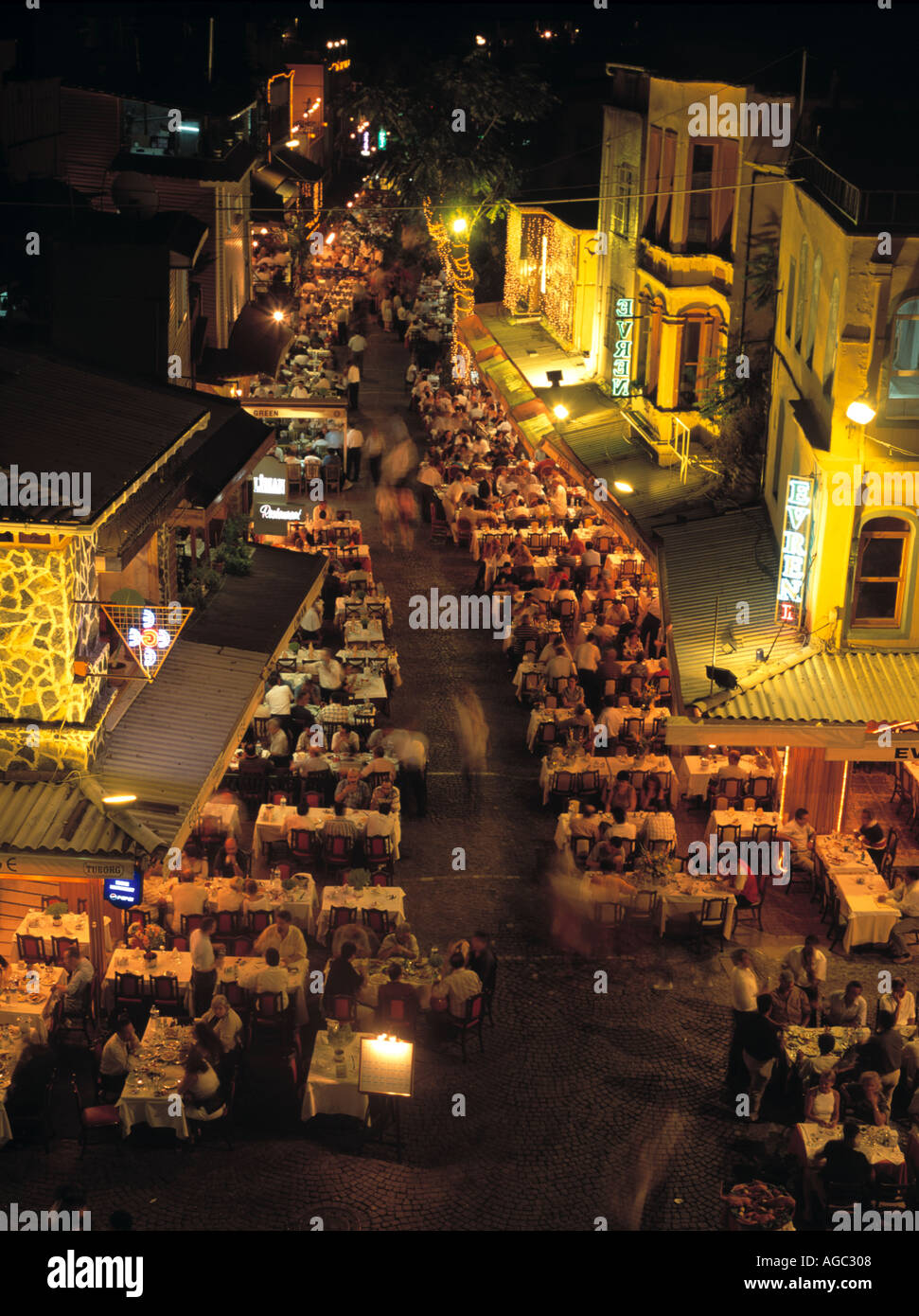 diners eating in the streets of Kumkapi an area famous for it s fish ...