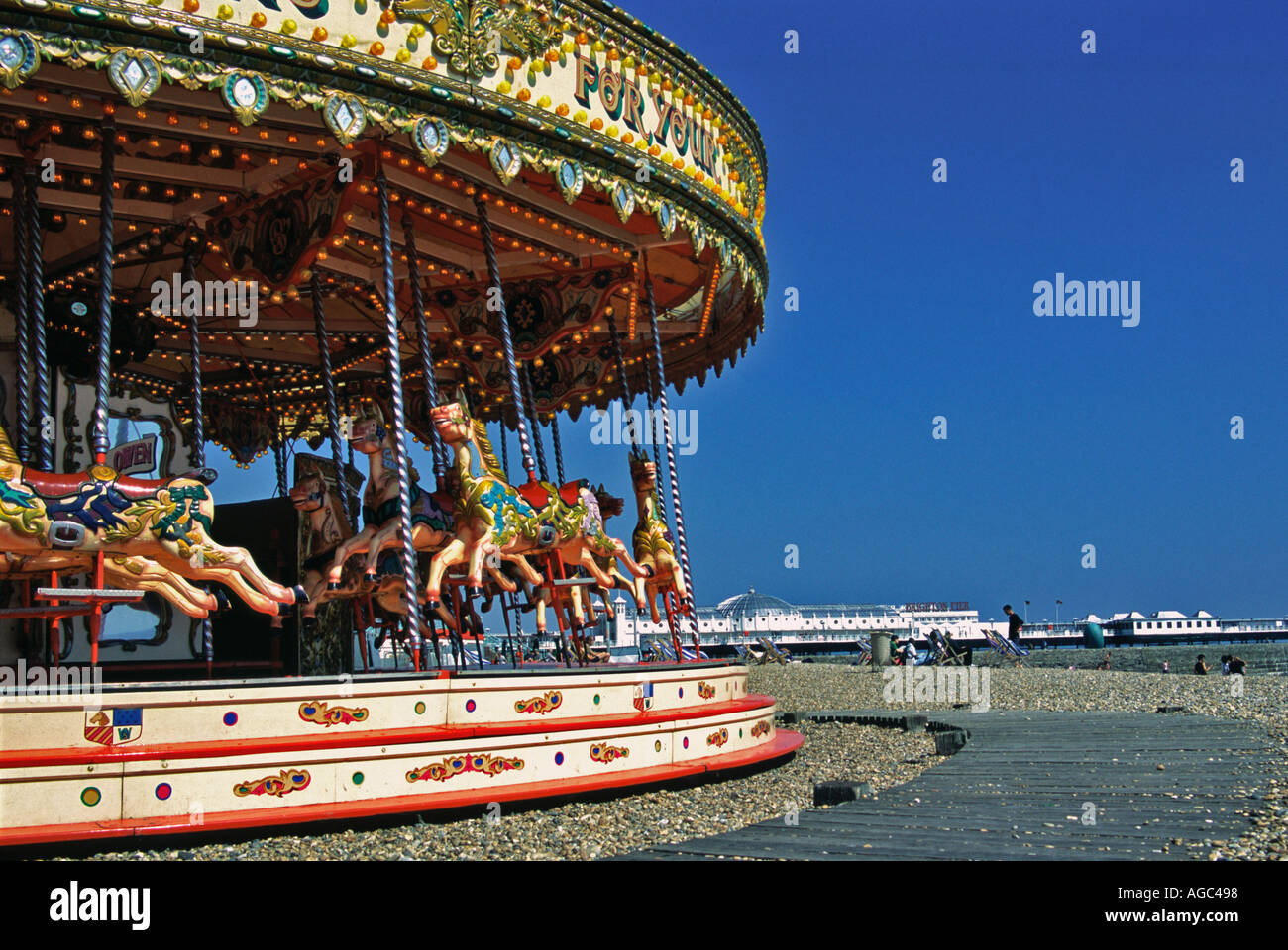 steam carousel on Brighton beach with Brighton Pier in background Stock ...