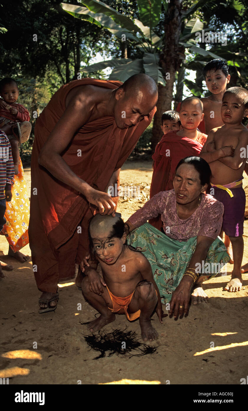 Young buddhist monk standing outside hi-res stock photography and ...