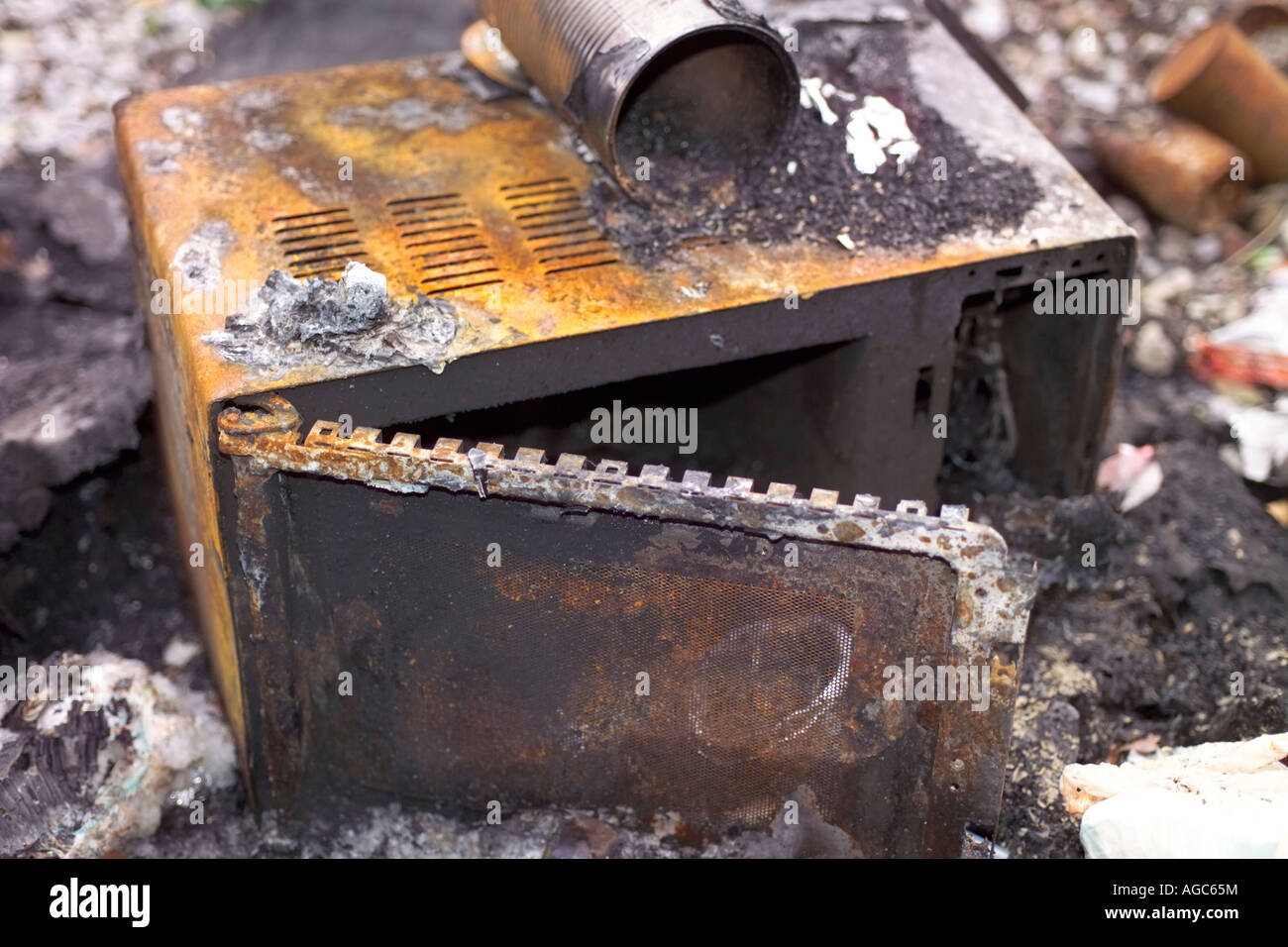 burnt out microwave oven in paddock Huddersfield Stock Photo - Alamy